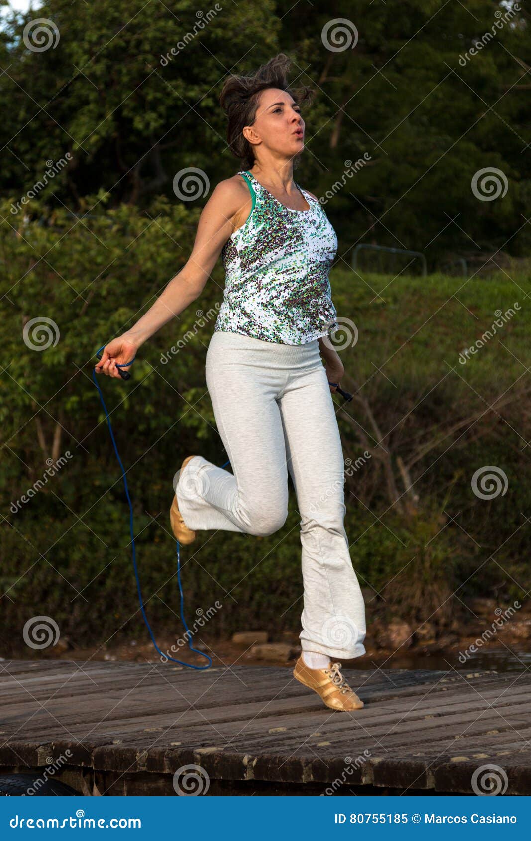 Woman Jumping Rope stock image. Image of aged, practice - 80755185