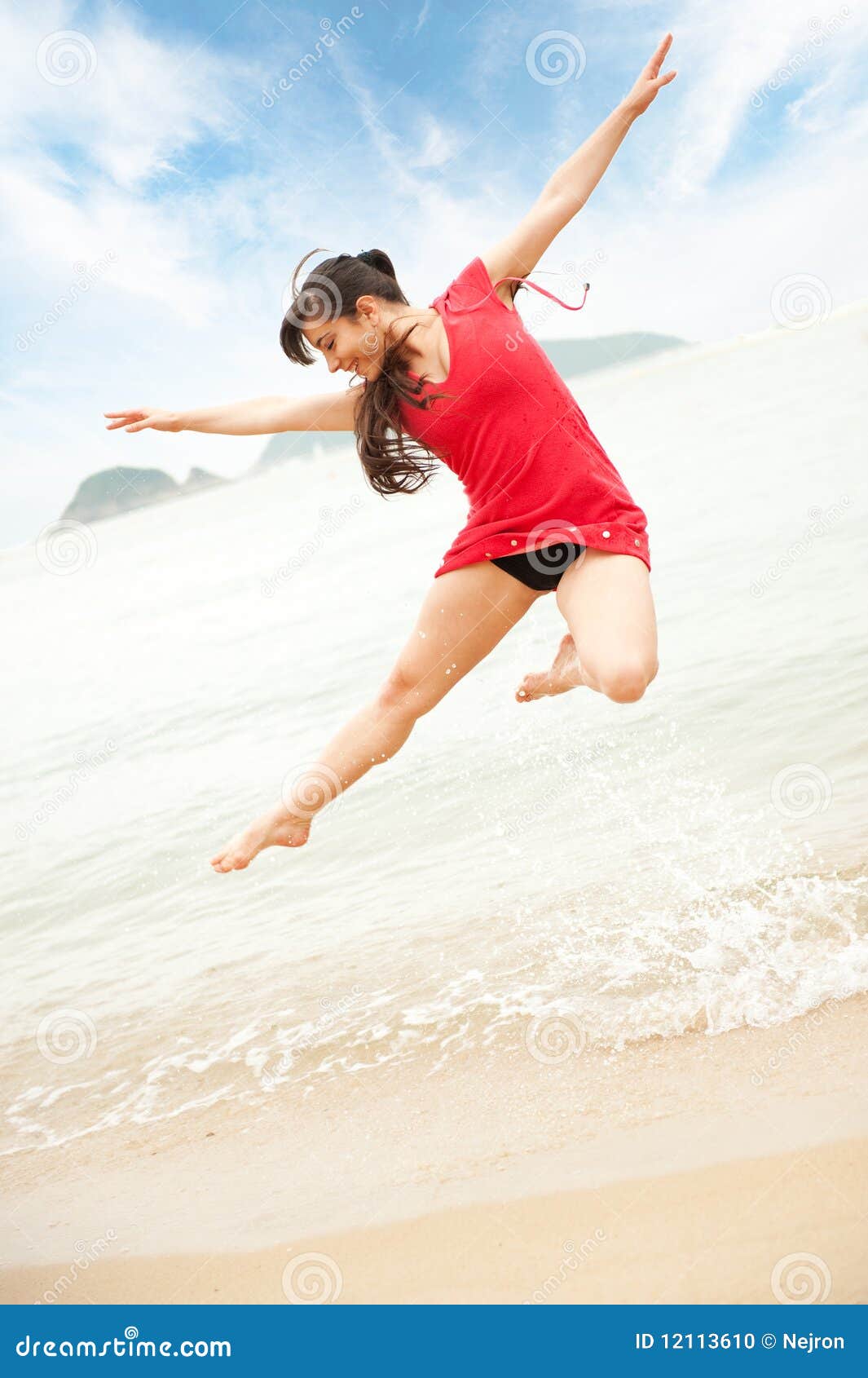 Woman jumping in the sea stock photo. Image of girl, ocean - 12113610