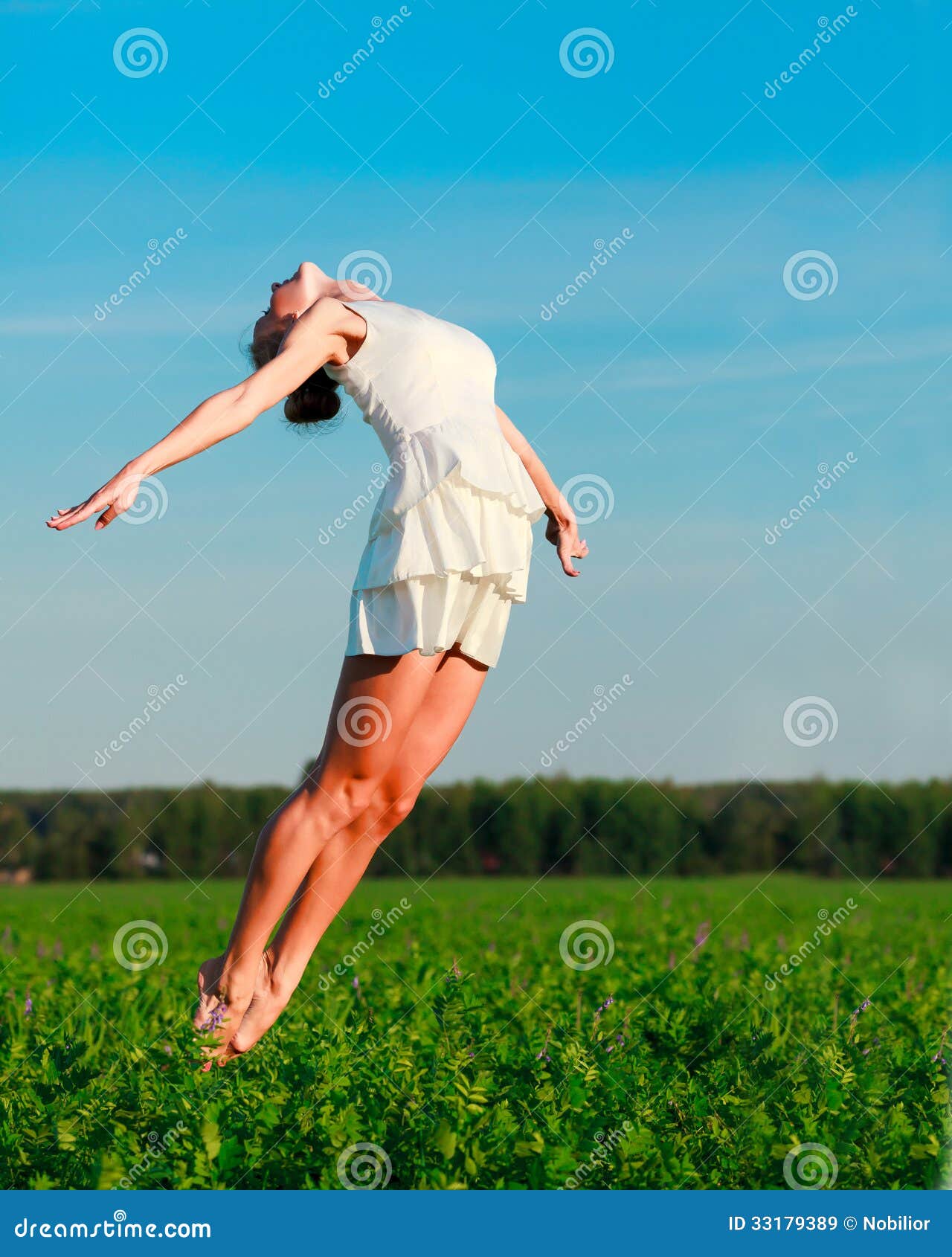 Woman jumps stock image. Image of meadow, jump, cheerful - 33179389