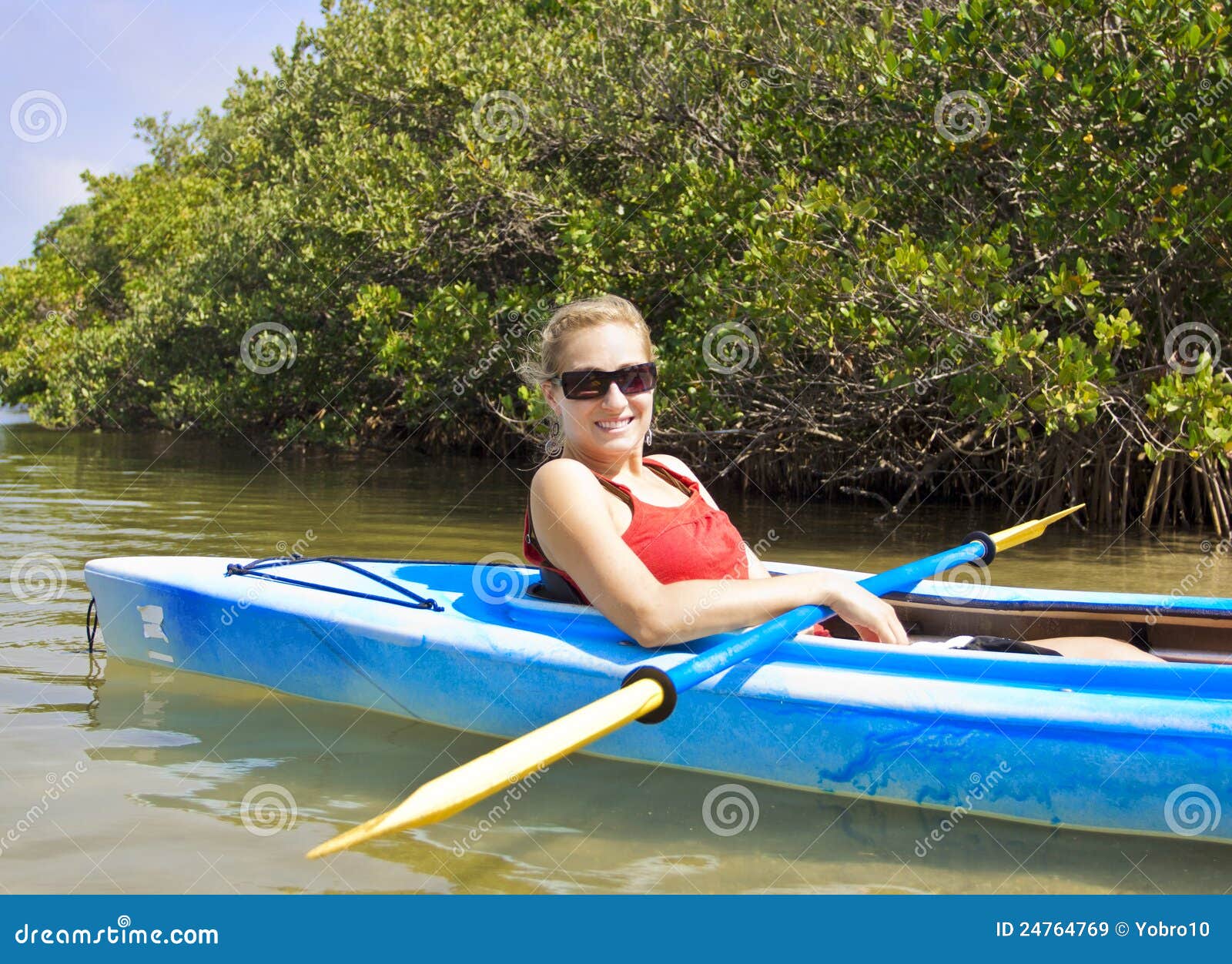 Woman Kayaking stock image. Image of nautical, mangroves - 24764769
