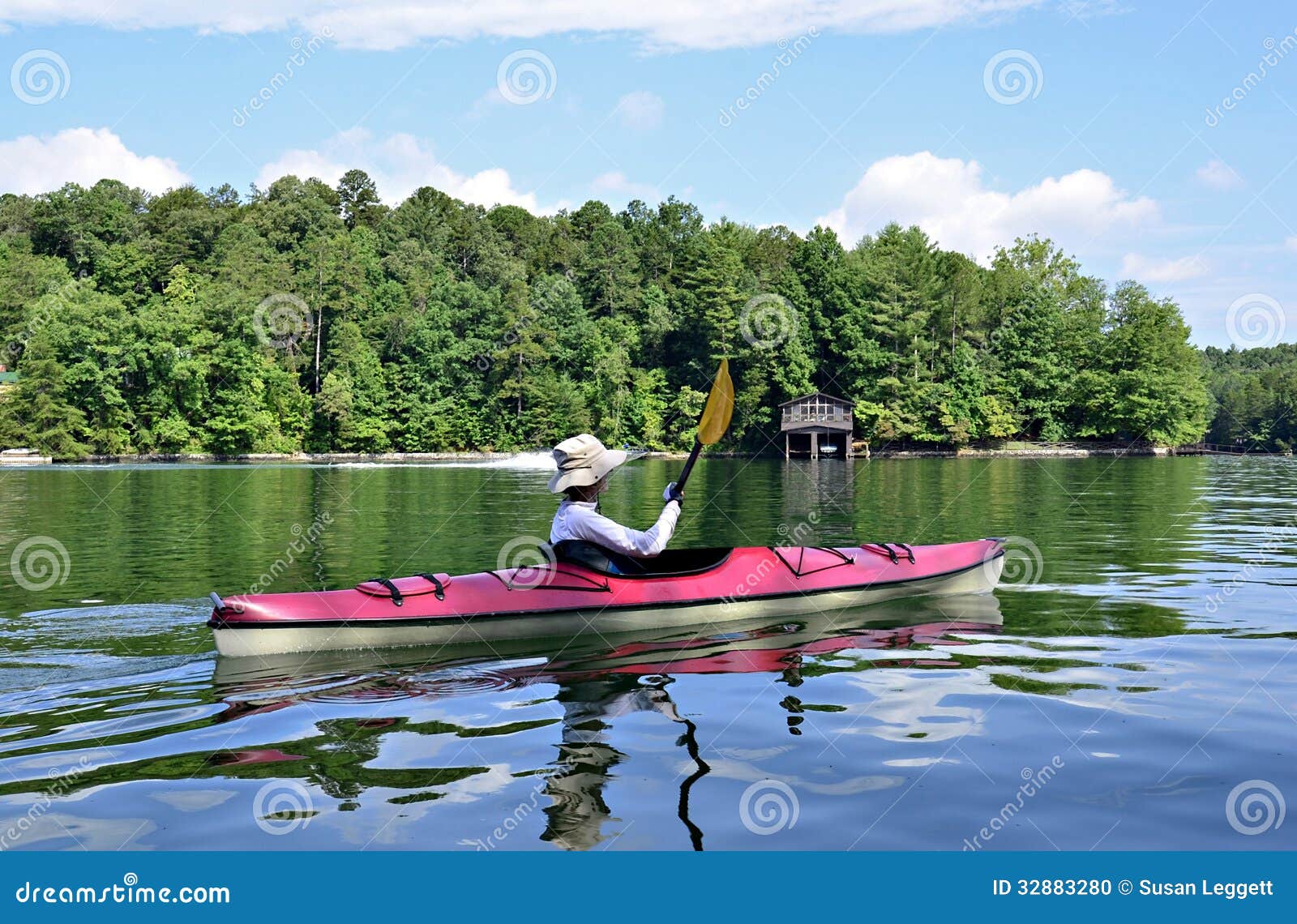 Woman Kayaking on Lake stock photo. Image of landscape - 32883280