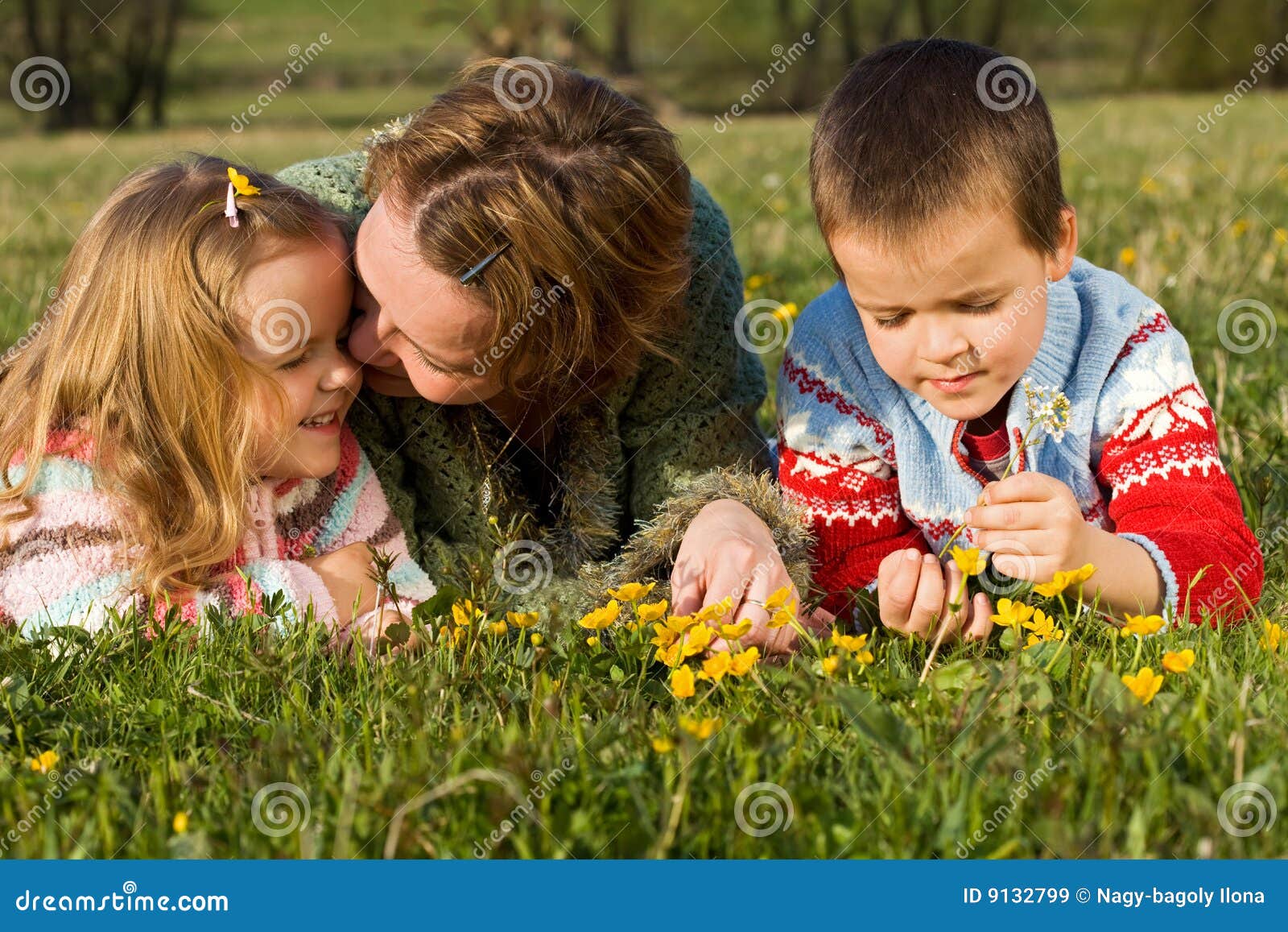 Woman and Kids Relaxing on the Spring Meadow Stock Image - Image of ...
