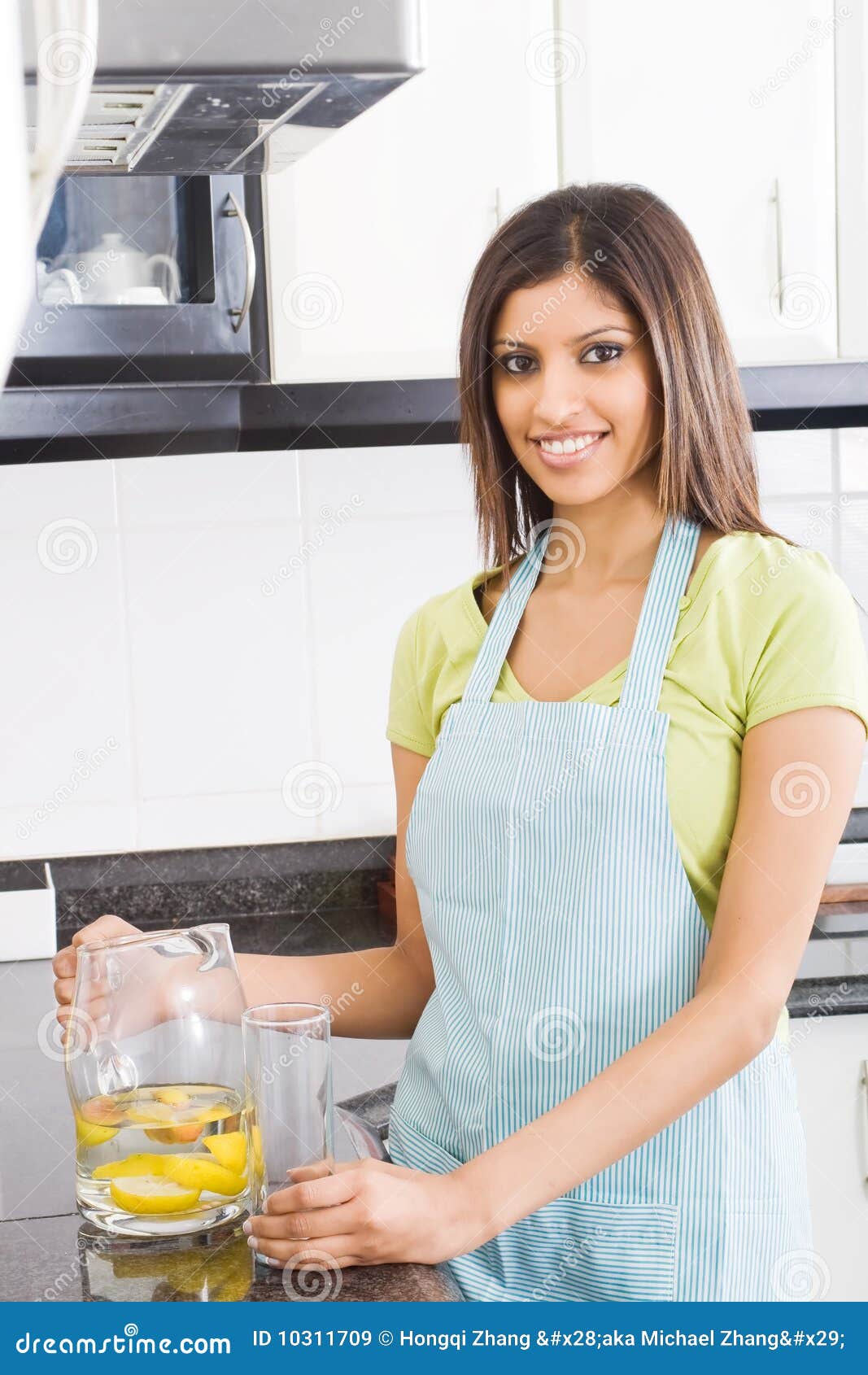 Woman in kitchen stock image. Image of elegant, beverage - 10311709