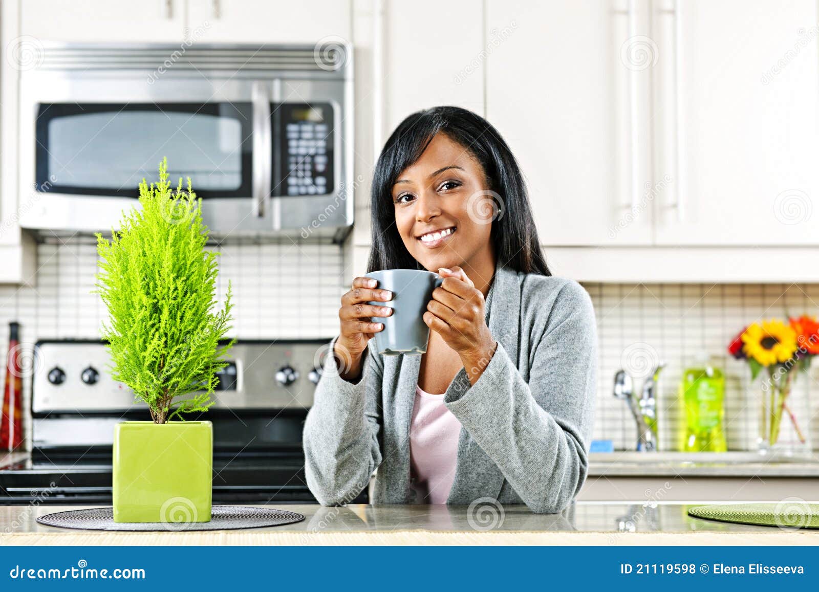 Woman in Kitchen with Coffee Cup Stock Photo - Image of indoors ...