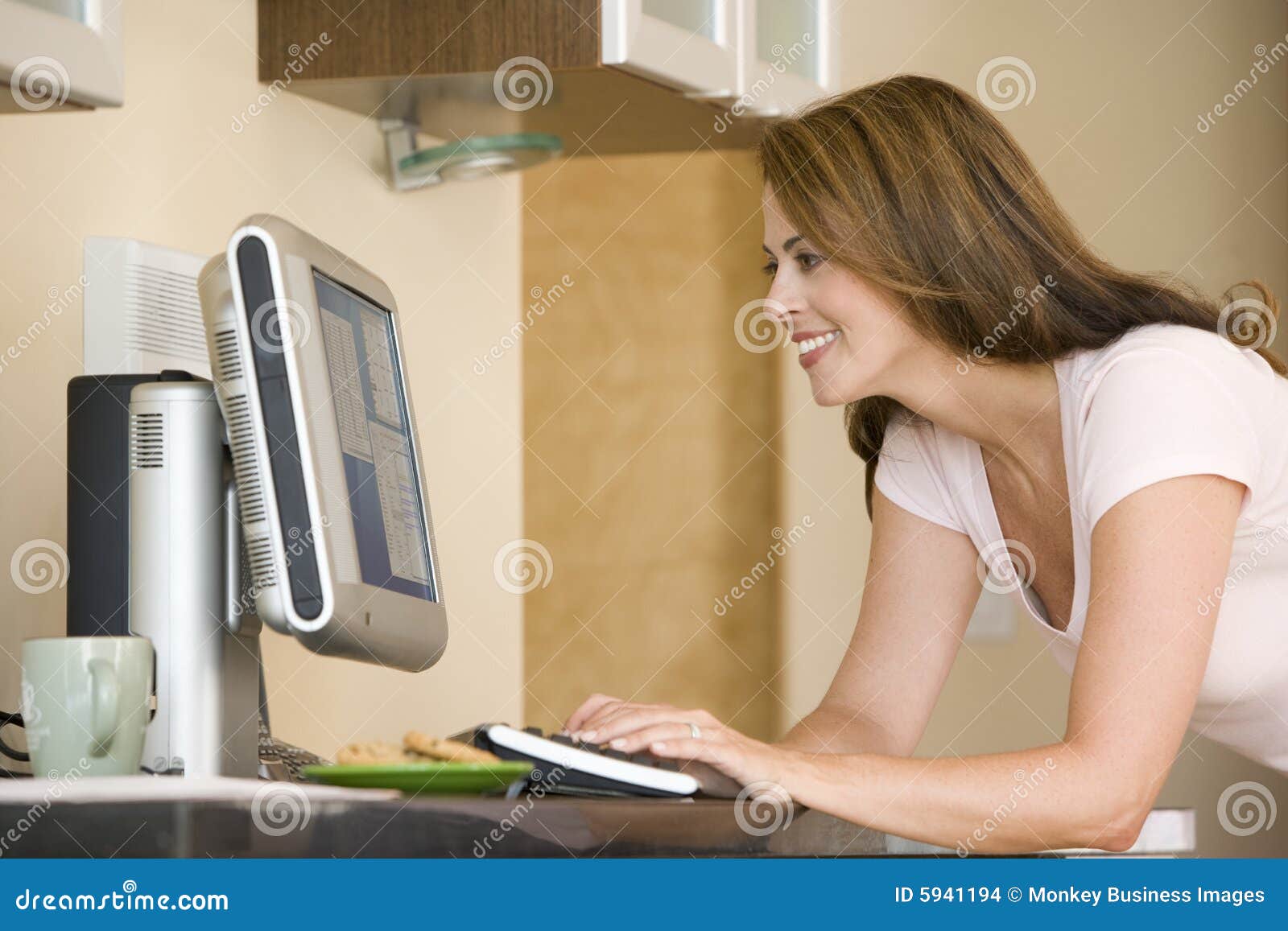Woman in Kitchen with Computer Stock Photo - Image of working, adult ...