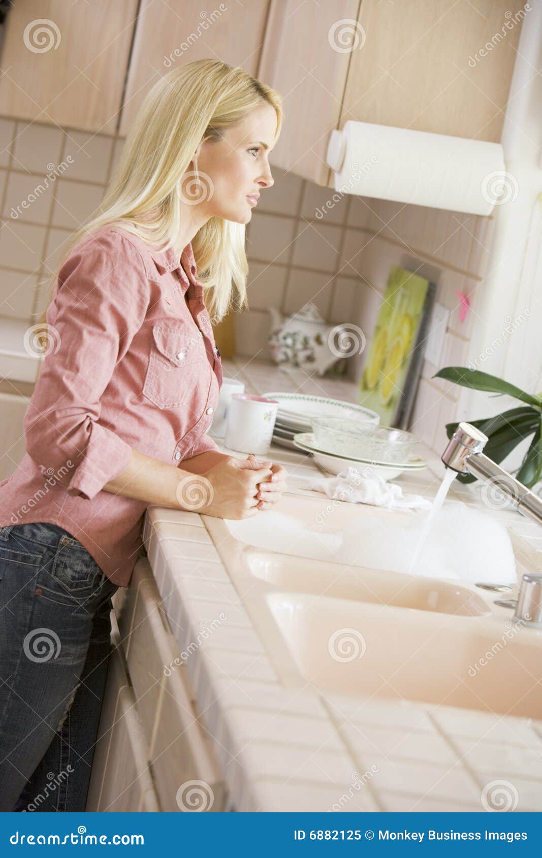 Woman at Kitchen Counter stock image. Image of adult, bored - 6882125