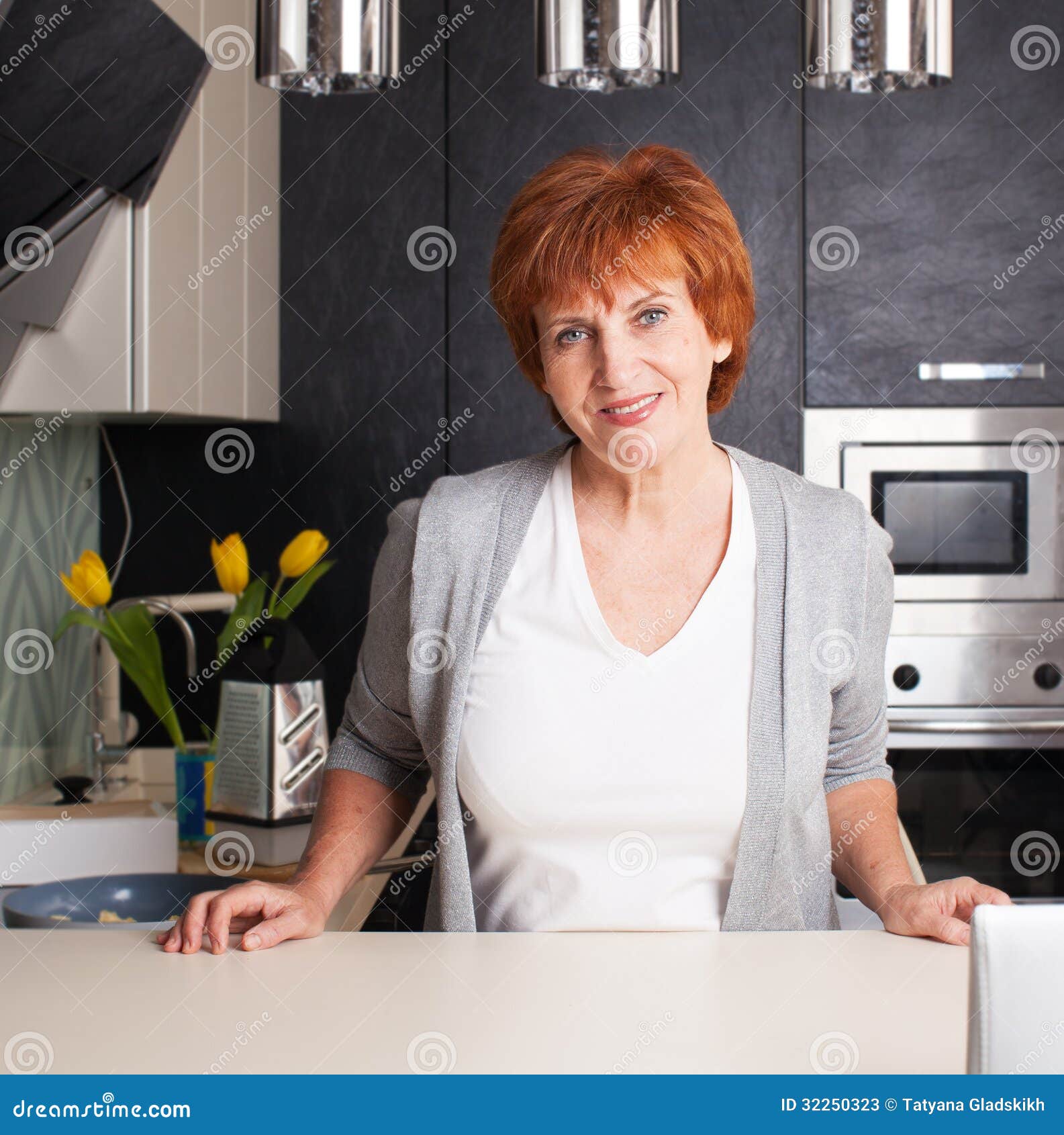 Woman at kitchen stock image. Image of lifestyle, kitchen - 32250323