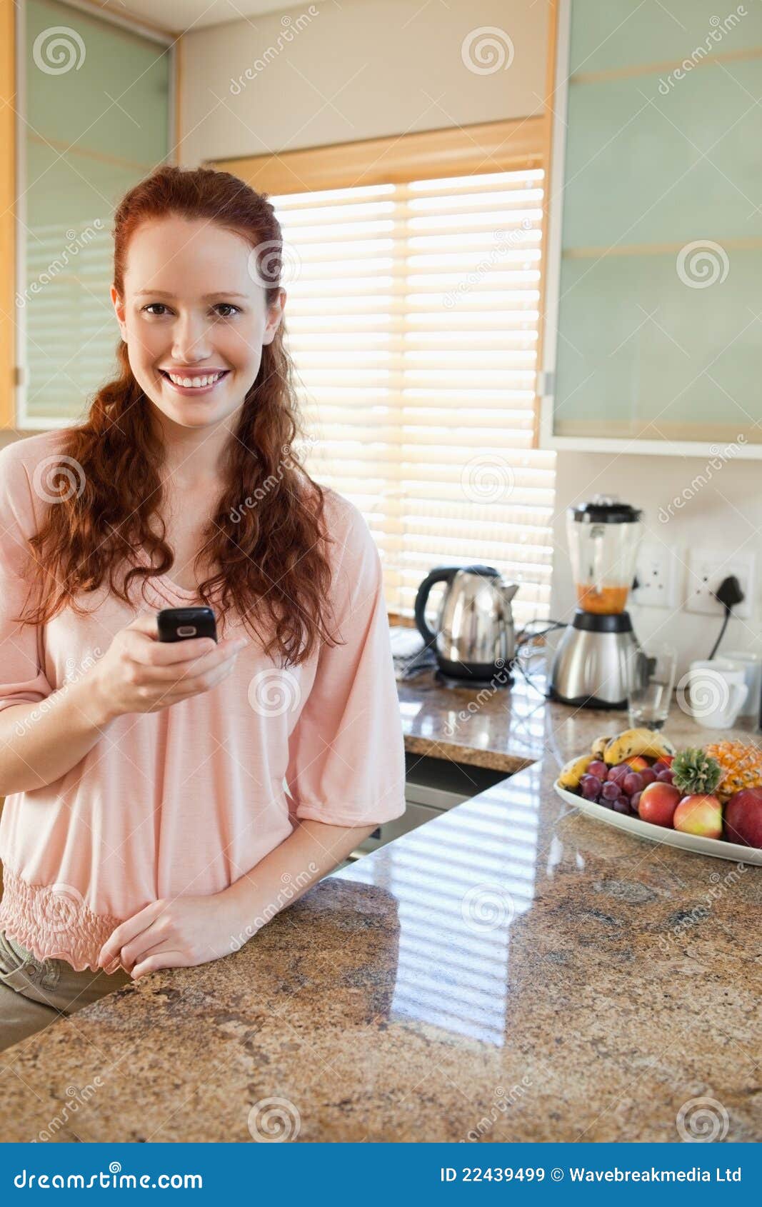 Woman in the Kitchen with Her Cellphone Stock Image - Image of home ...