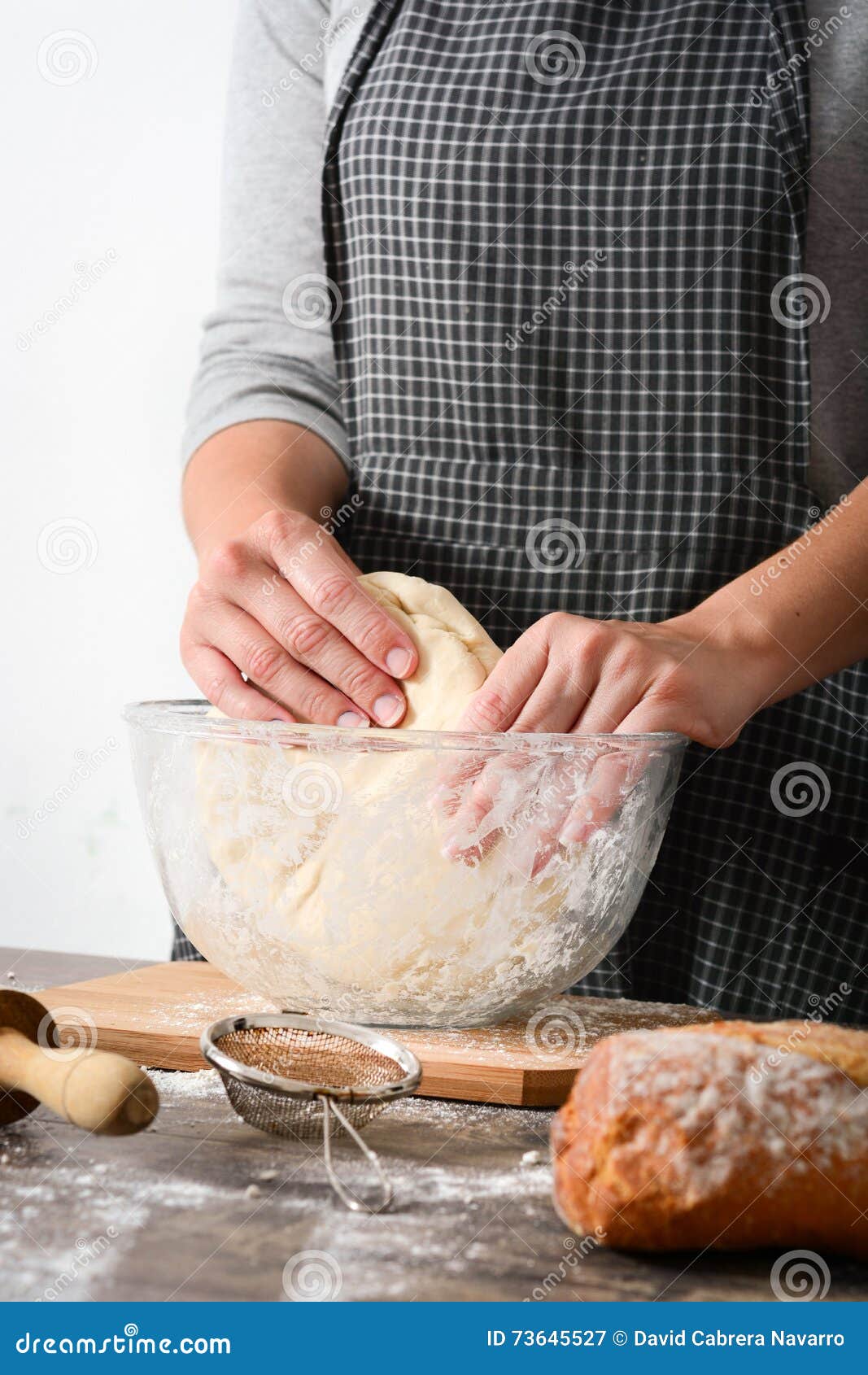 Woman kneading bread dough stock image. Image of baking - 73645527