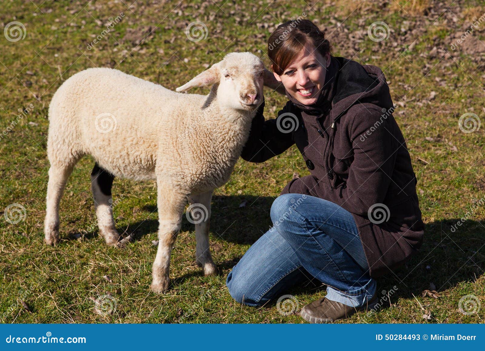 Woman Kneeling beside a Small Lamb Stock Image - Image of nature ...