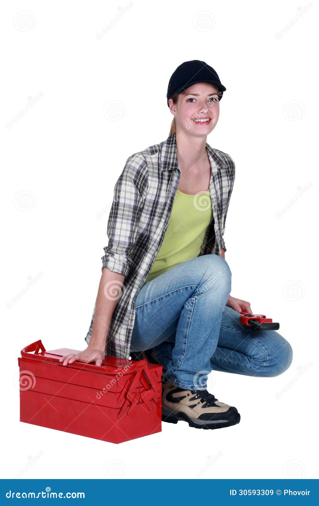 Woman kneeling by tool kit stock image. Image of industrial - 30593309