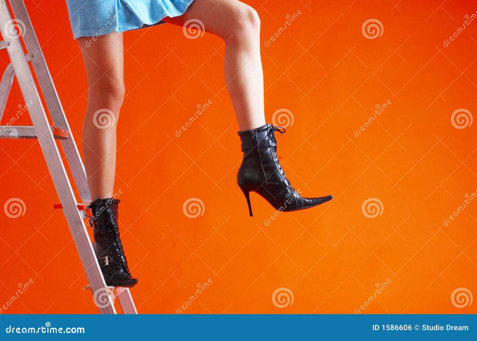 Woman On Ladder Fitting Light Bulb In New House Royalty-Free Stock ...