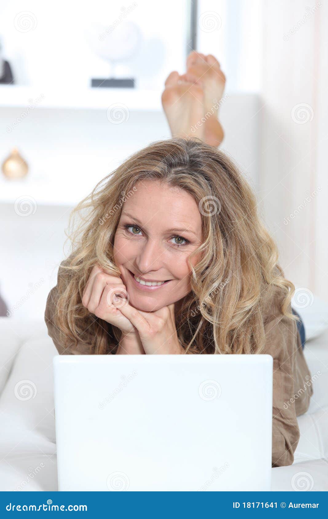 Woman Laid in Front of a Laptop Stock Image - Image of home, laptop ...