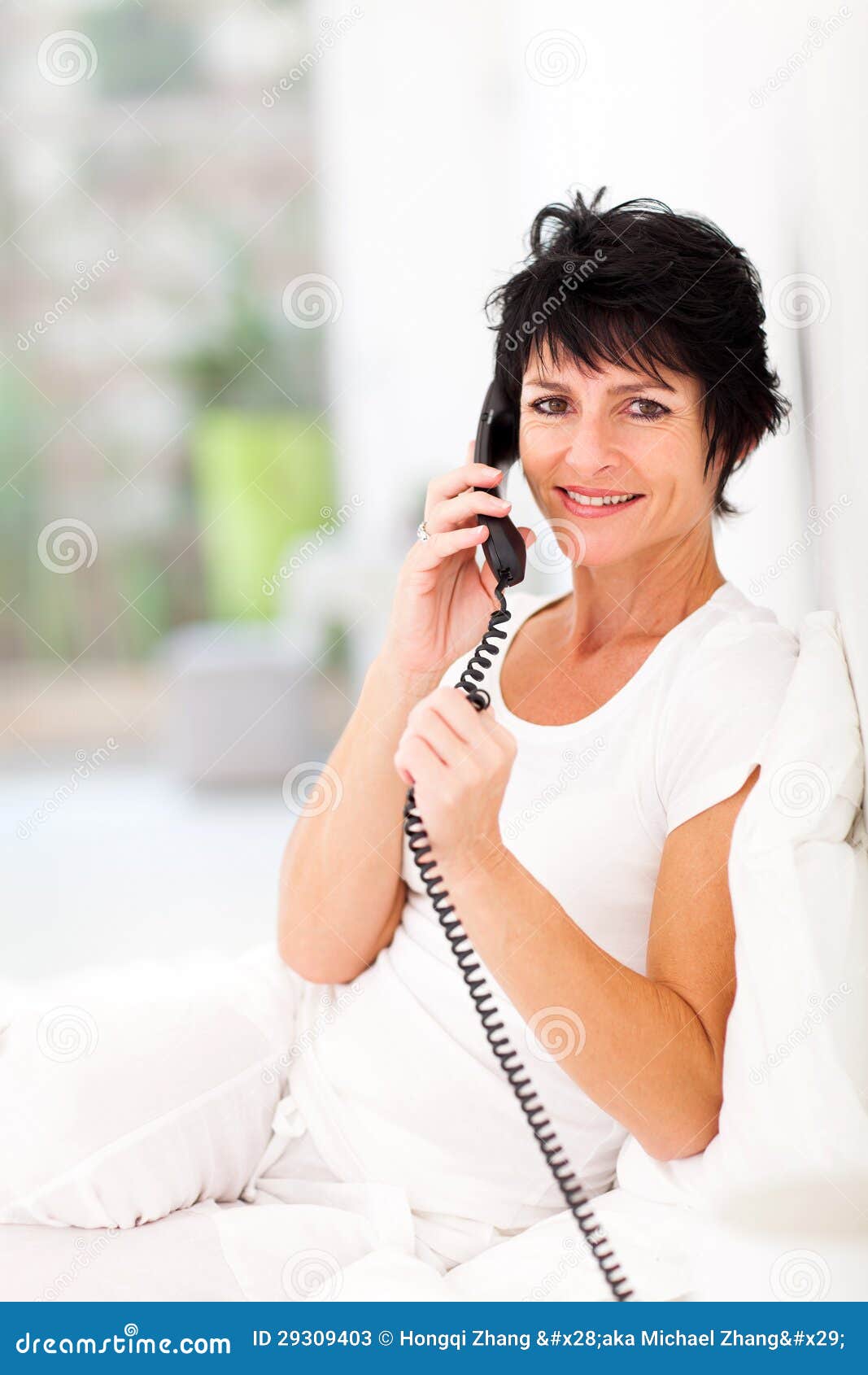 Woman landline phone stock image. Image of peaceful, handset - 29309403