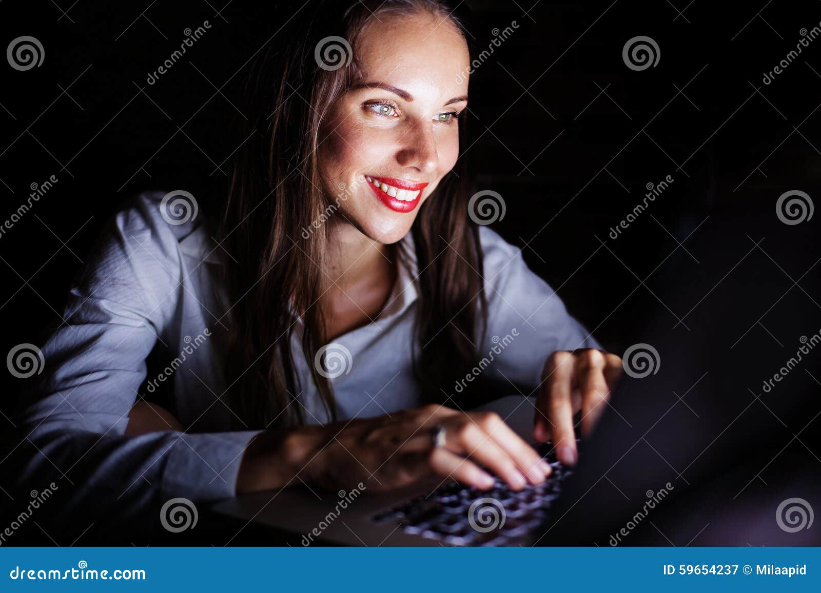 Woman with laptop at night stock image. Image of laptop - 59654237