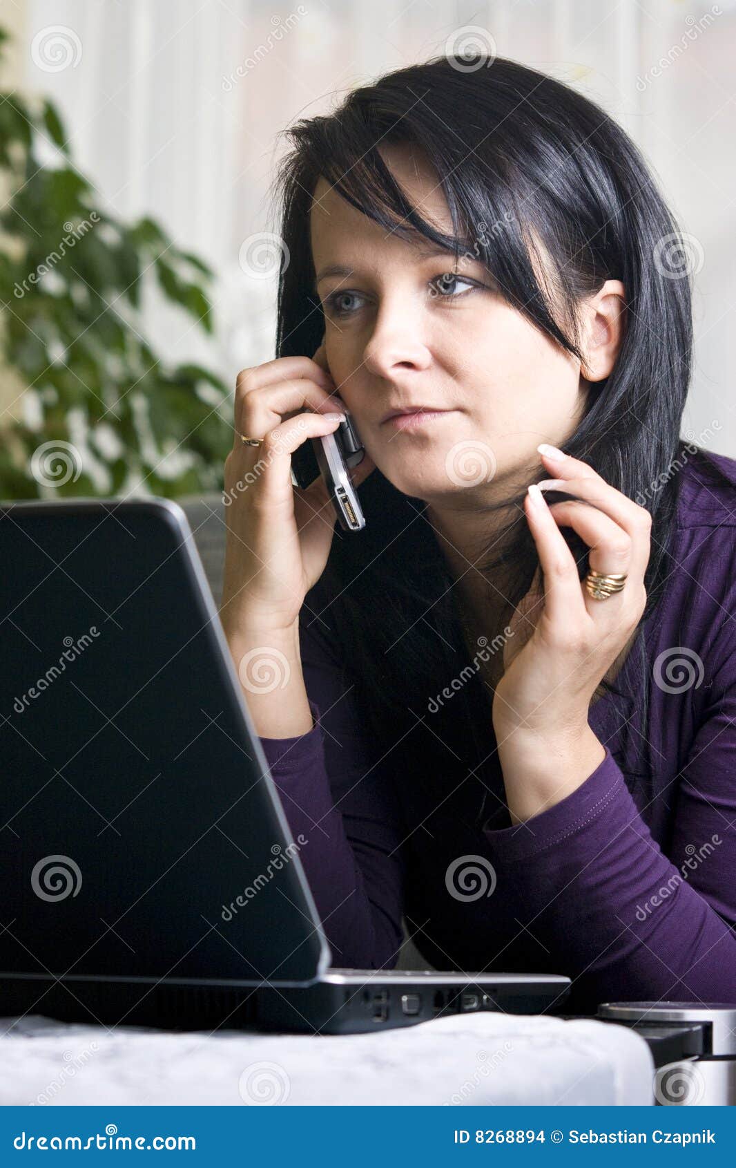 Woman on laptop and phone stock photo. Image of active - 8268894