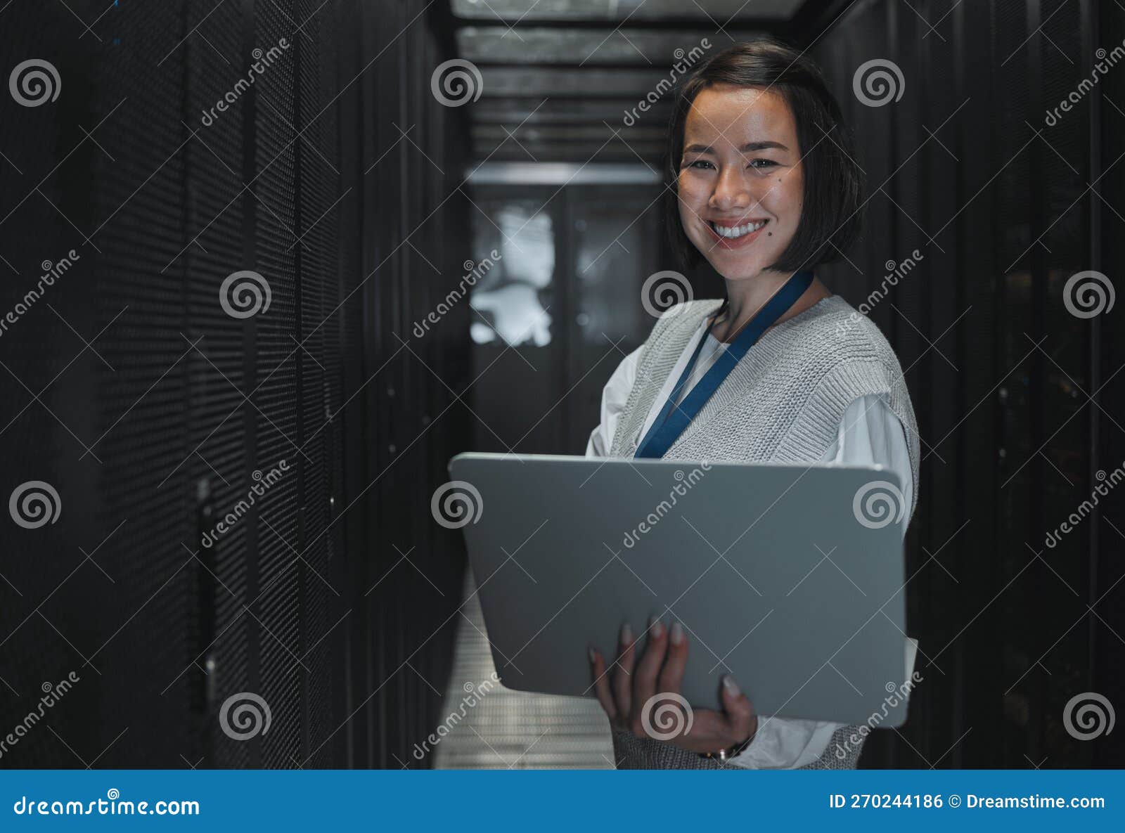 Woman with Laptop, Server Room and Information Technology, Smile in ...