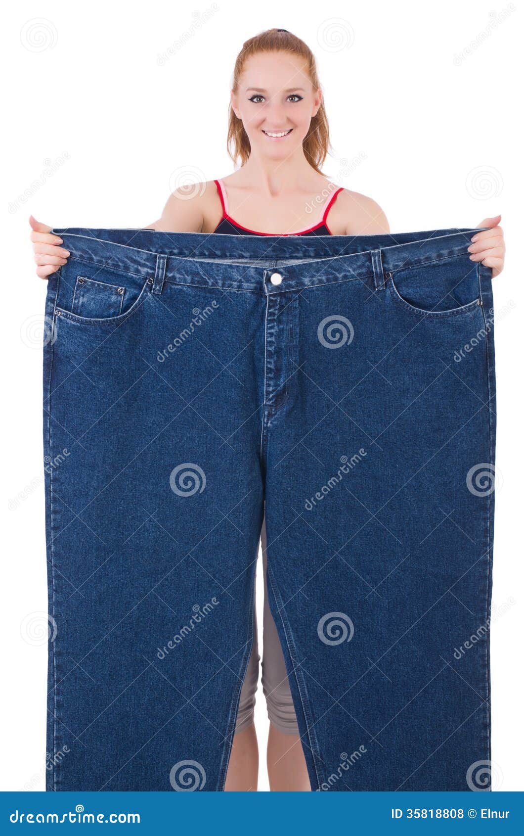 Woman with large jeans stock photo. Image of measurement - 35818808