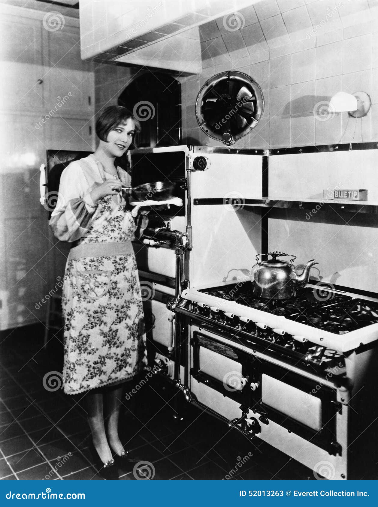Woman with large stove stock image. Image of adults, antique - 52013263