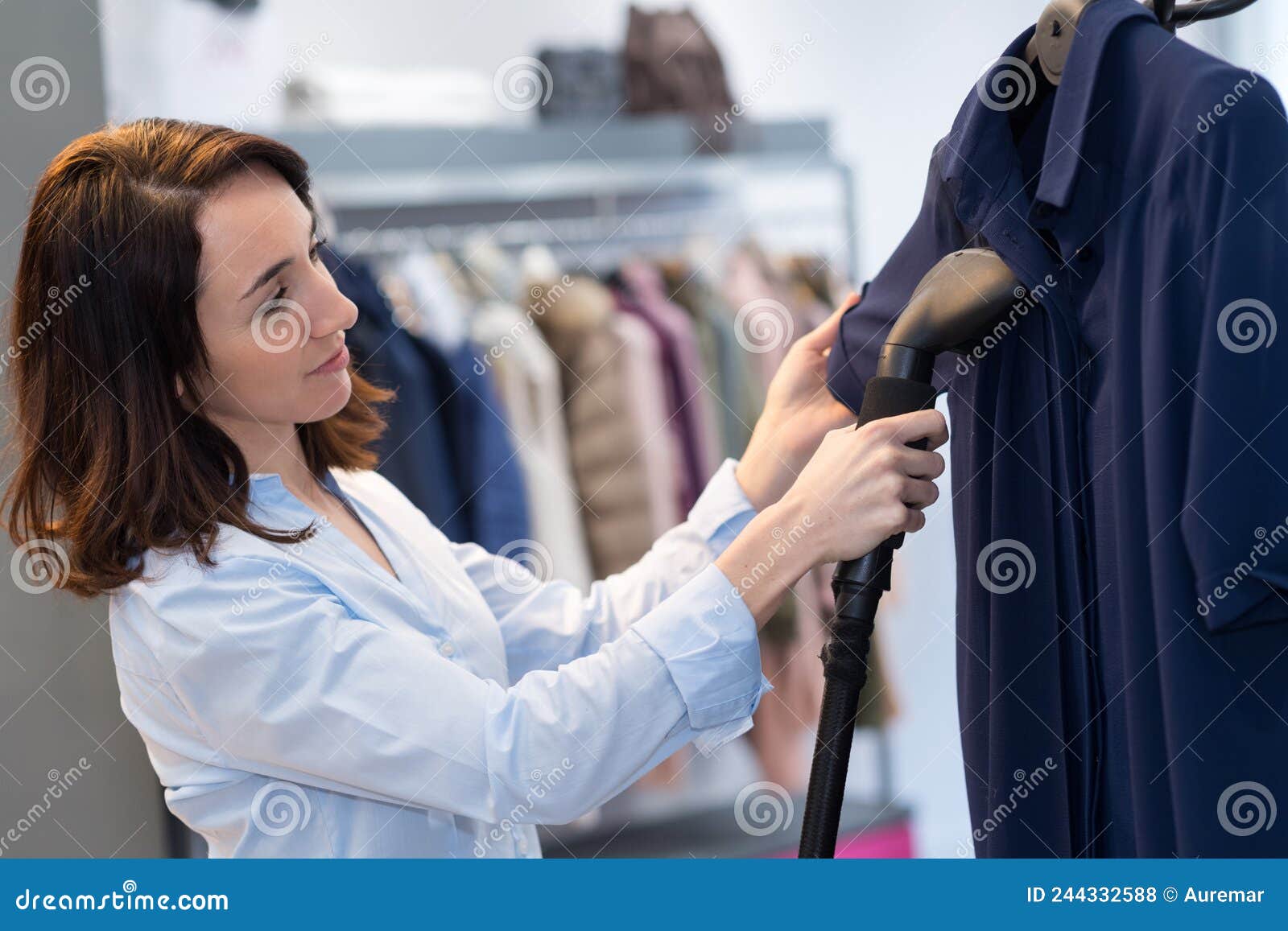 Woman Laundry Worker at Dry Cleaners Stock Photo - Image of person ...