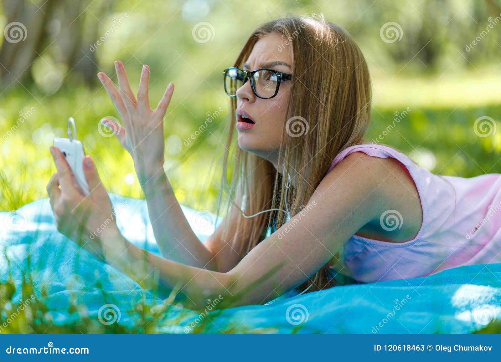 Woman Lay Down or Relaxing on Green Grass Reading Book in Summer or ... Woman Lay Down or Relaxing on Green Grass Reading Book in Summer or ...