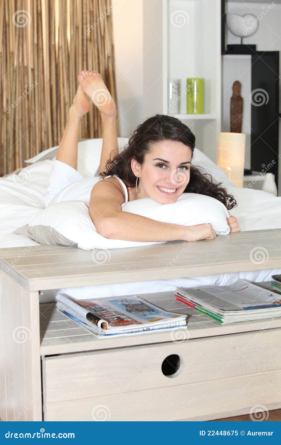 Woman laying in bed stock image. Image of paper, horizontal - 22448675