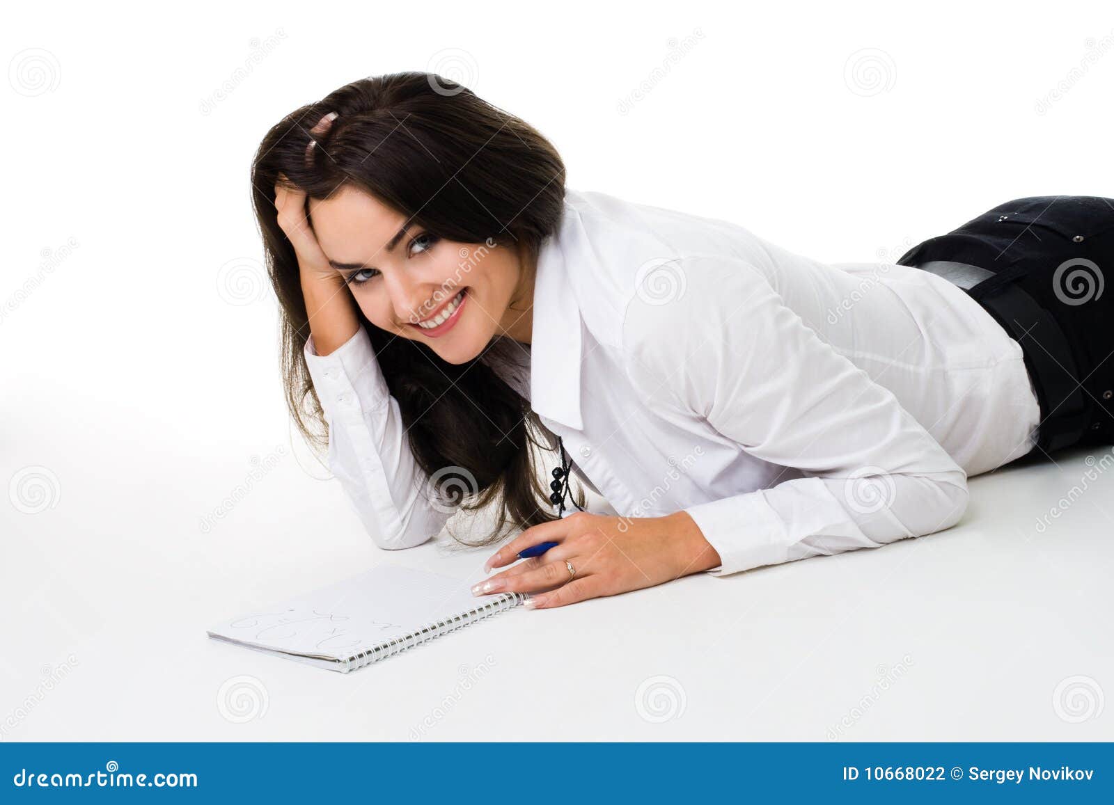 Woman Laying on the Floor with Note Book Smiling a Stock Photo - Image ...