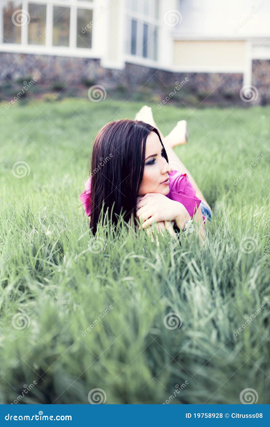 Woman laying on grass stock photo. Image of horizontal - 19758928