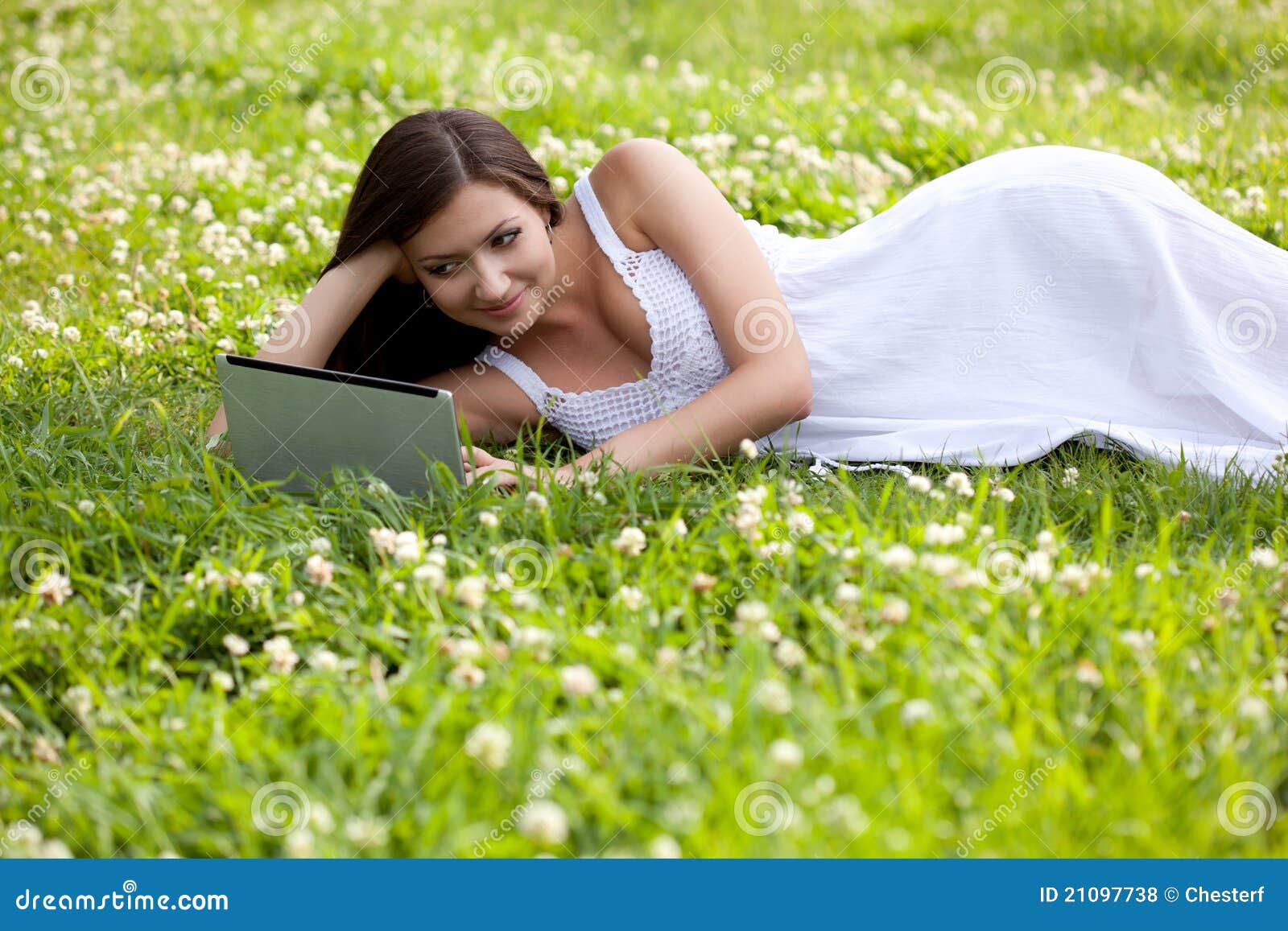 Woman laying on grass stock photo. Image of beauty, female - 21097738