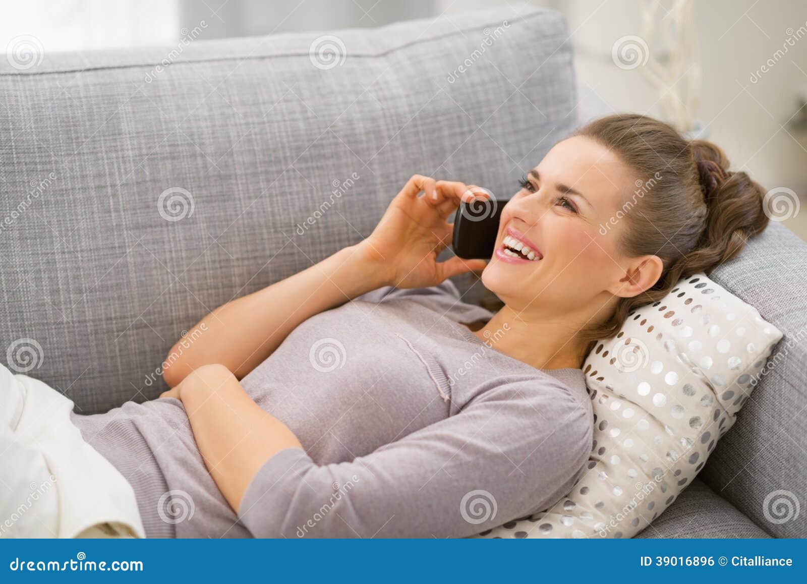Woman Laying on Sofa and Talking Mobile Phone Stock Photo - Image of ...