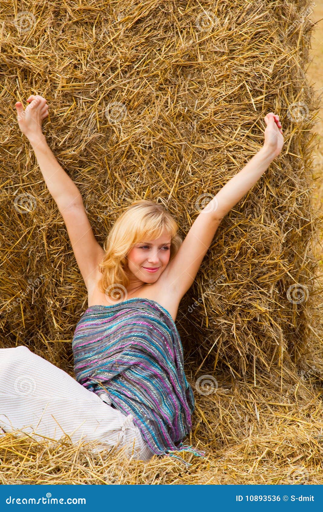 Woman laying on a straw stock photo. Image of summer - 10893536