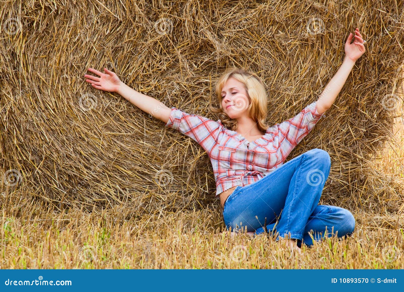 Woman laying on a straw stock photo. Image of fashion - 10893570