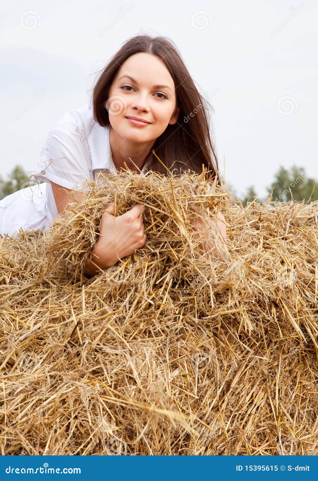 Woman laying on a straw stock image. Image of summer - 15395615