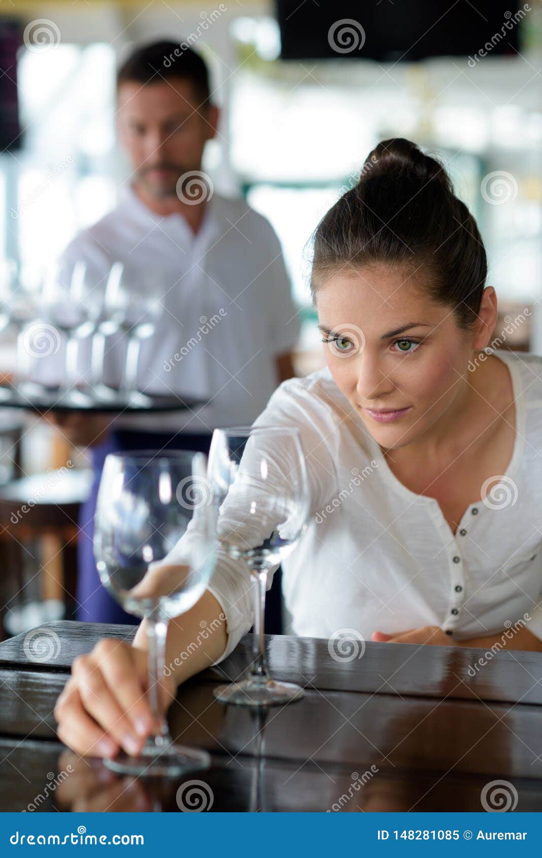 Woman laying a table stock image. Image of cheer, cuisine - 148281085