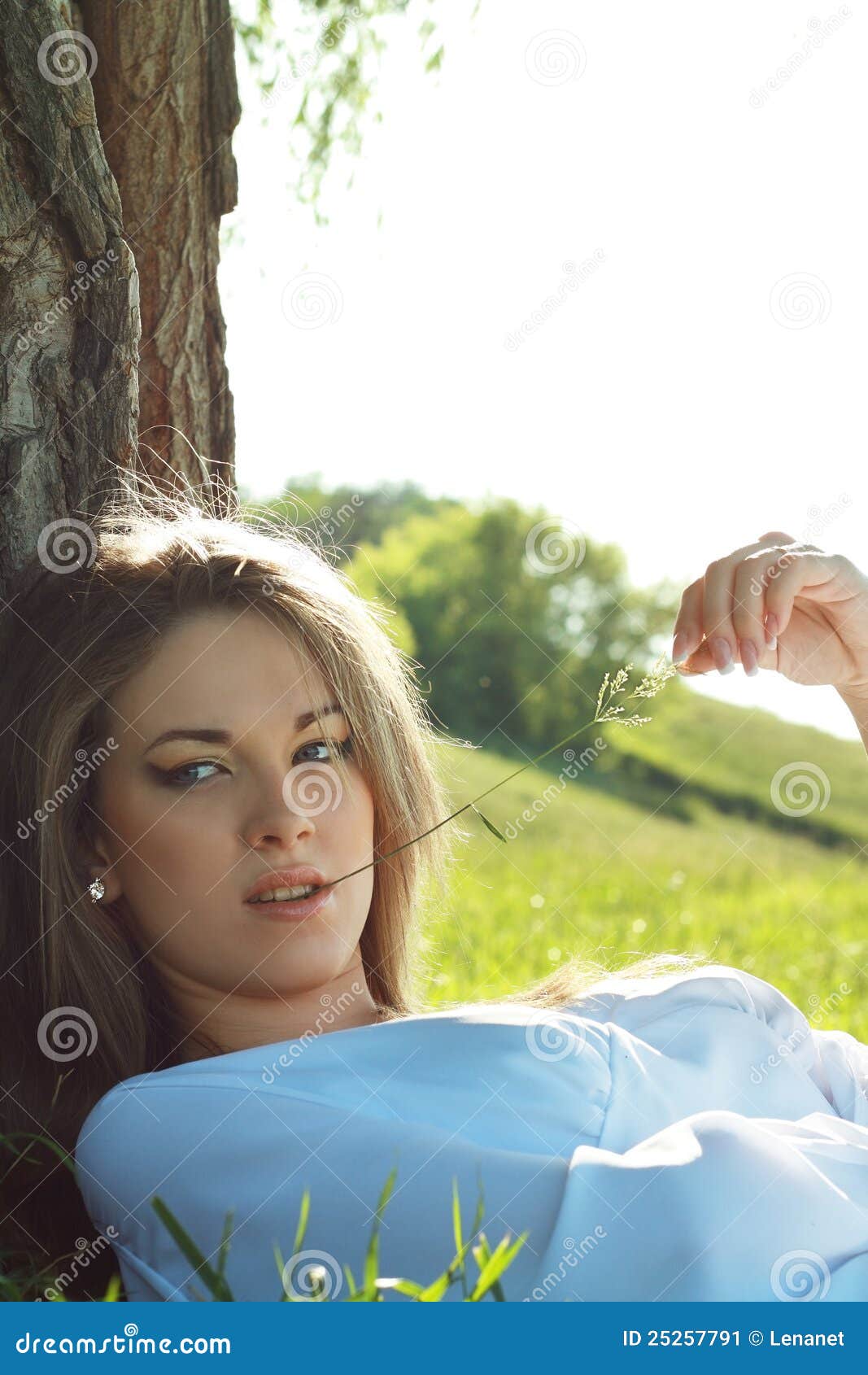 Woman Laying Under The Tree Stock Image - Image: 25257791