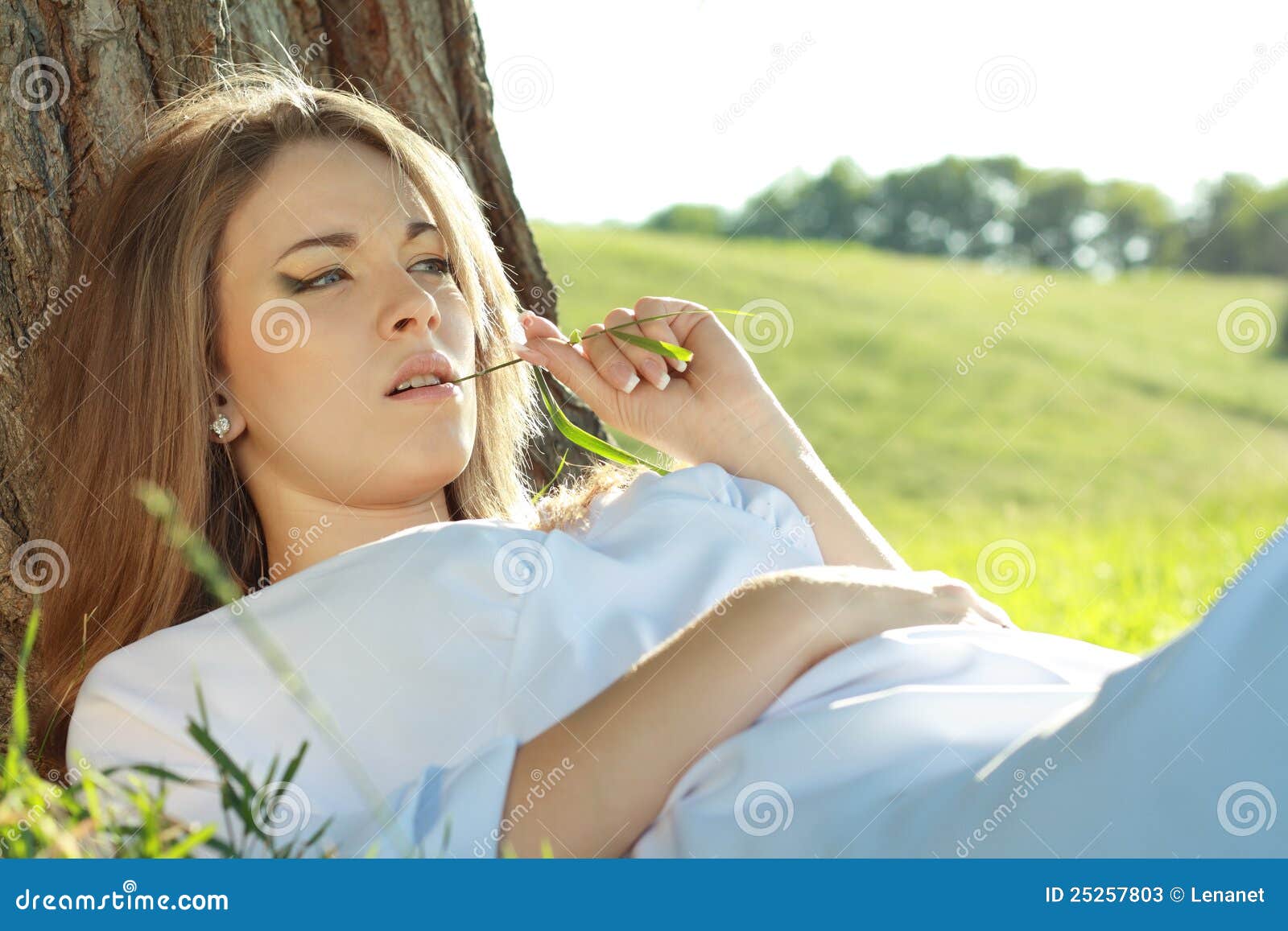 Woman Laying Under the Tree Stock Image - Image of concept, model: 25257803