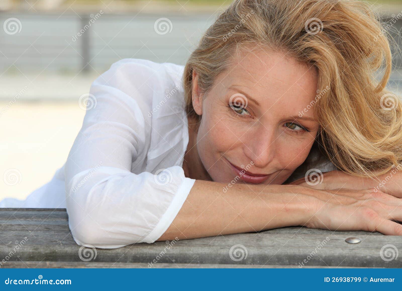 Woman leaning on a bench stock image. Image of leisure - 26938799