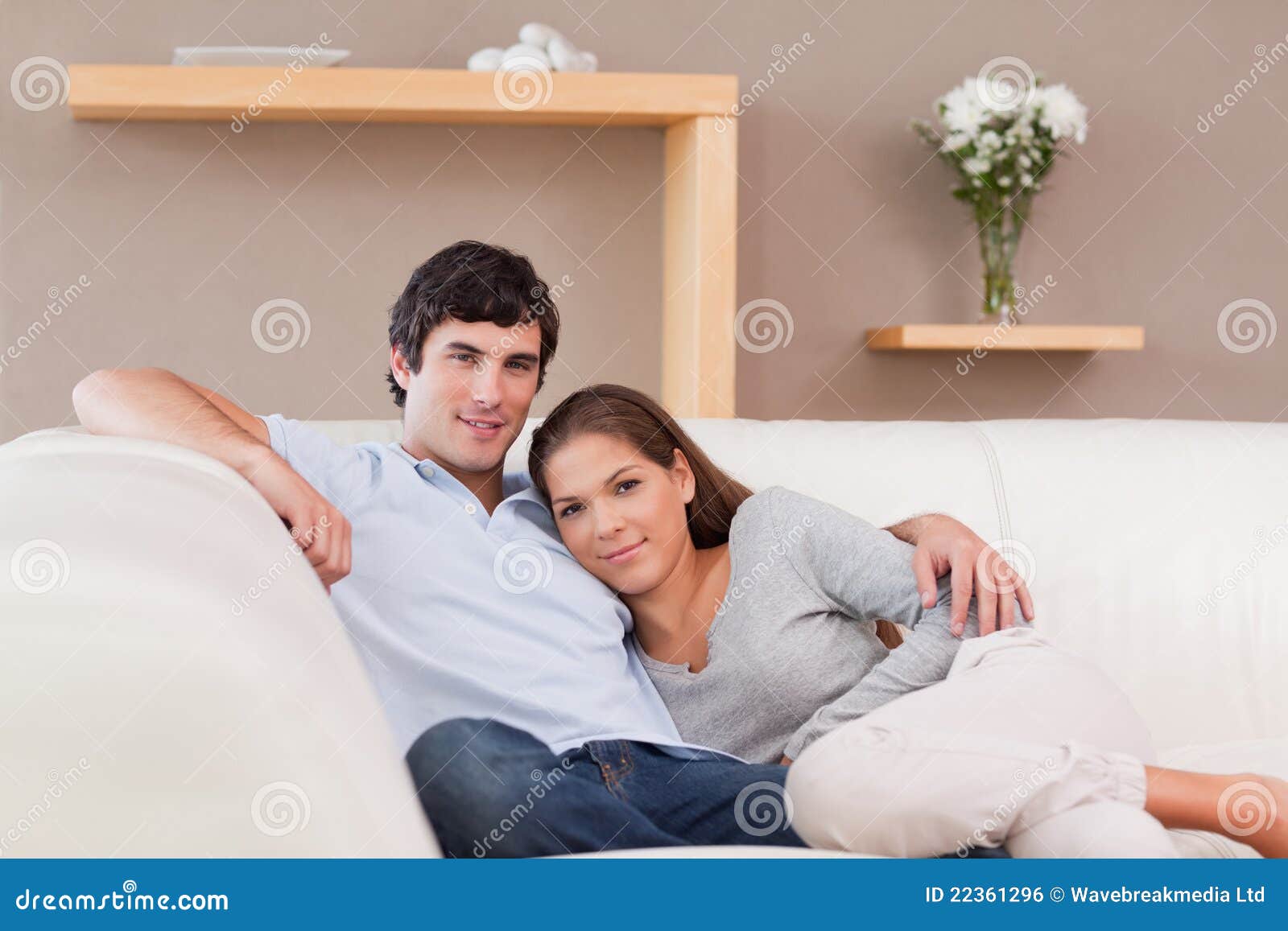 Woman Leaning on Her Boyfriend on the Sofa Stock Photo - Image of ...
