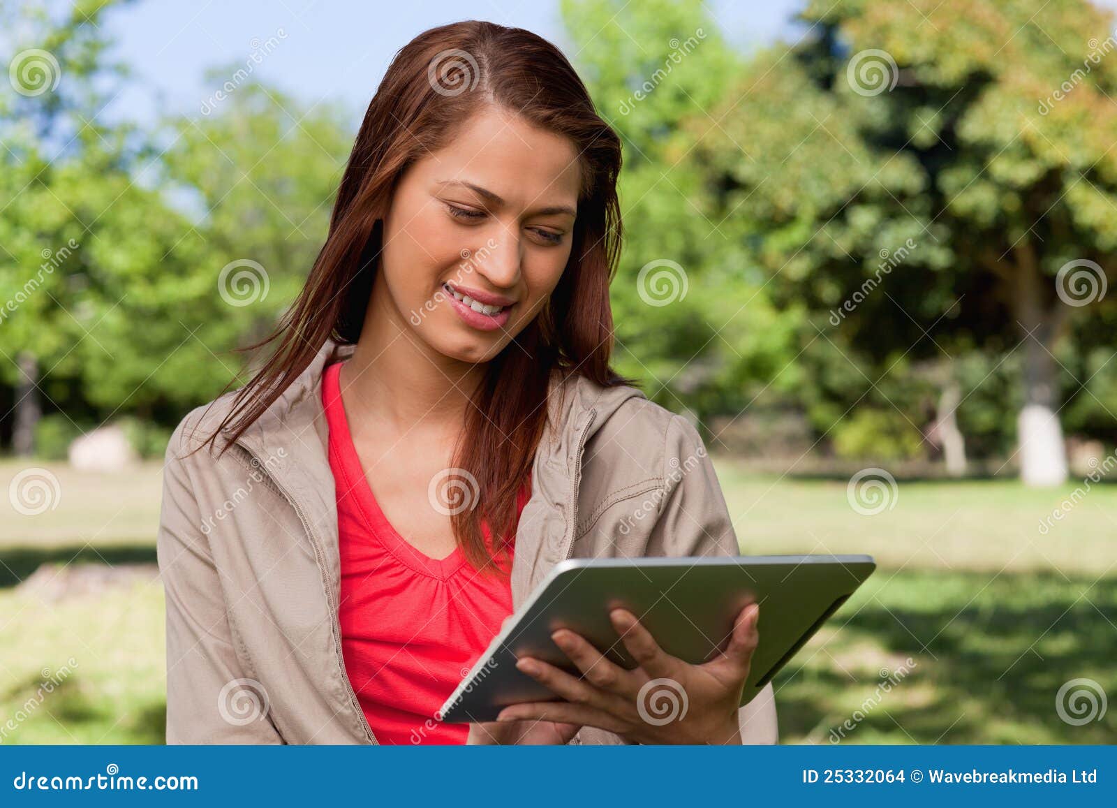 Woman Leaning Her Head To the Side while Smiling Stock Photo - Image of ...