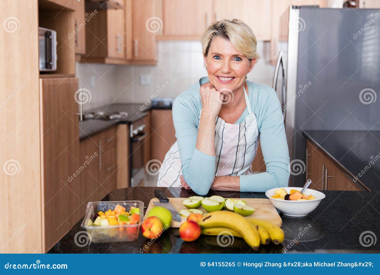 Woman Leaning Kitchen Counter Stock Image - Image of aged, home: 64155265