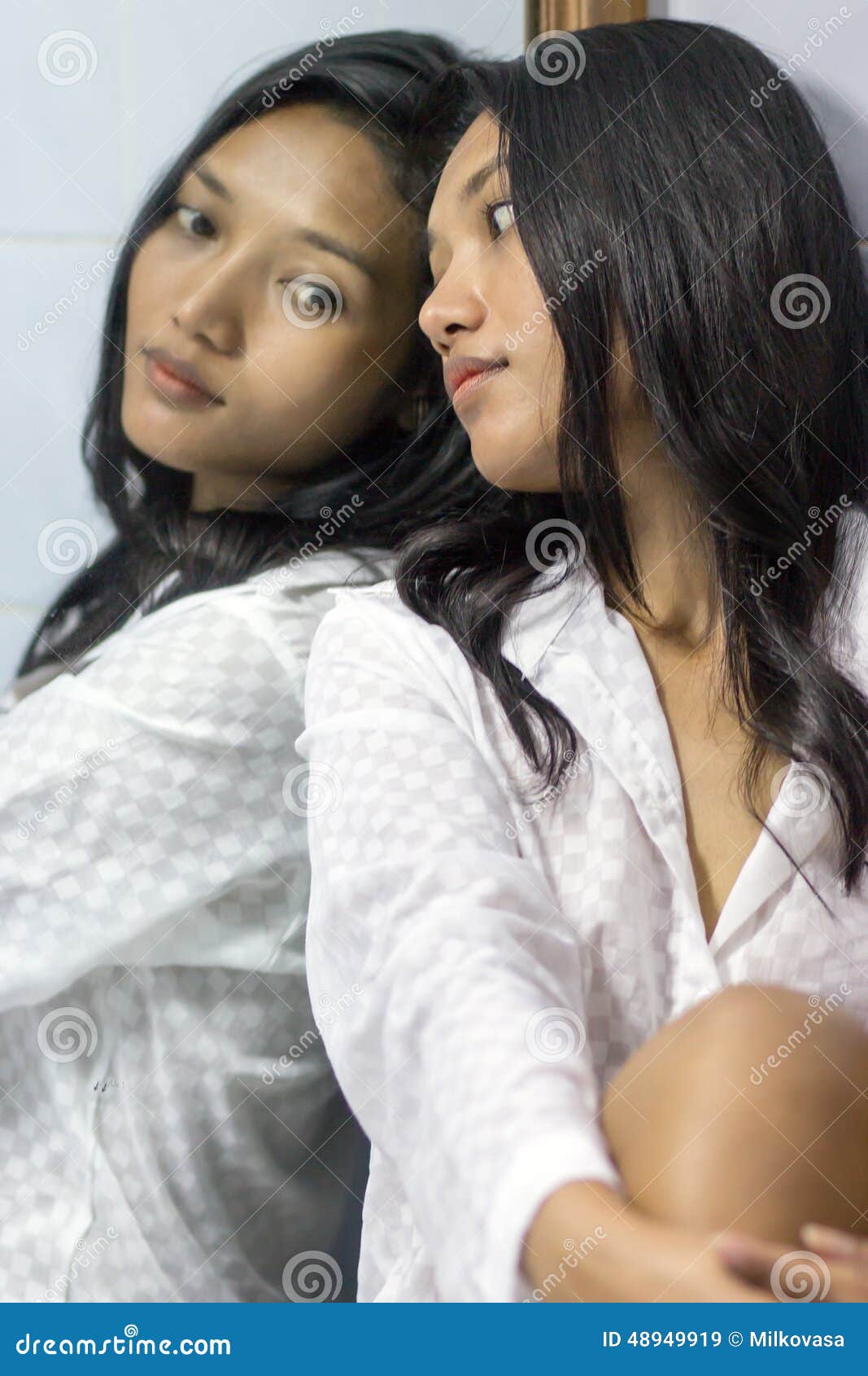 Woman leaning on a mirror stock image. Image of interior - 48949919