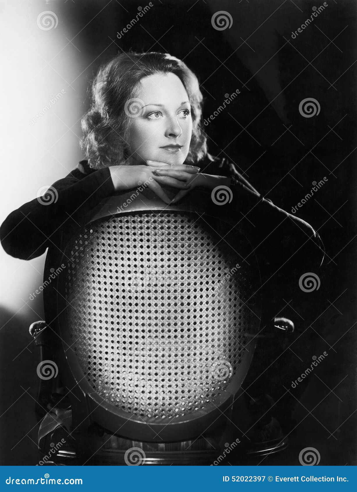 Woman Leaning Over the Back of a Chair Stock Image - Image of hair ...