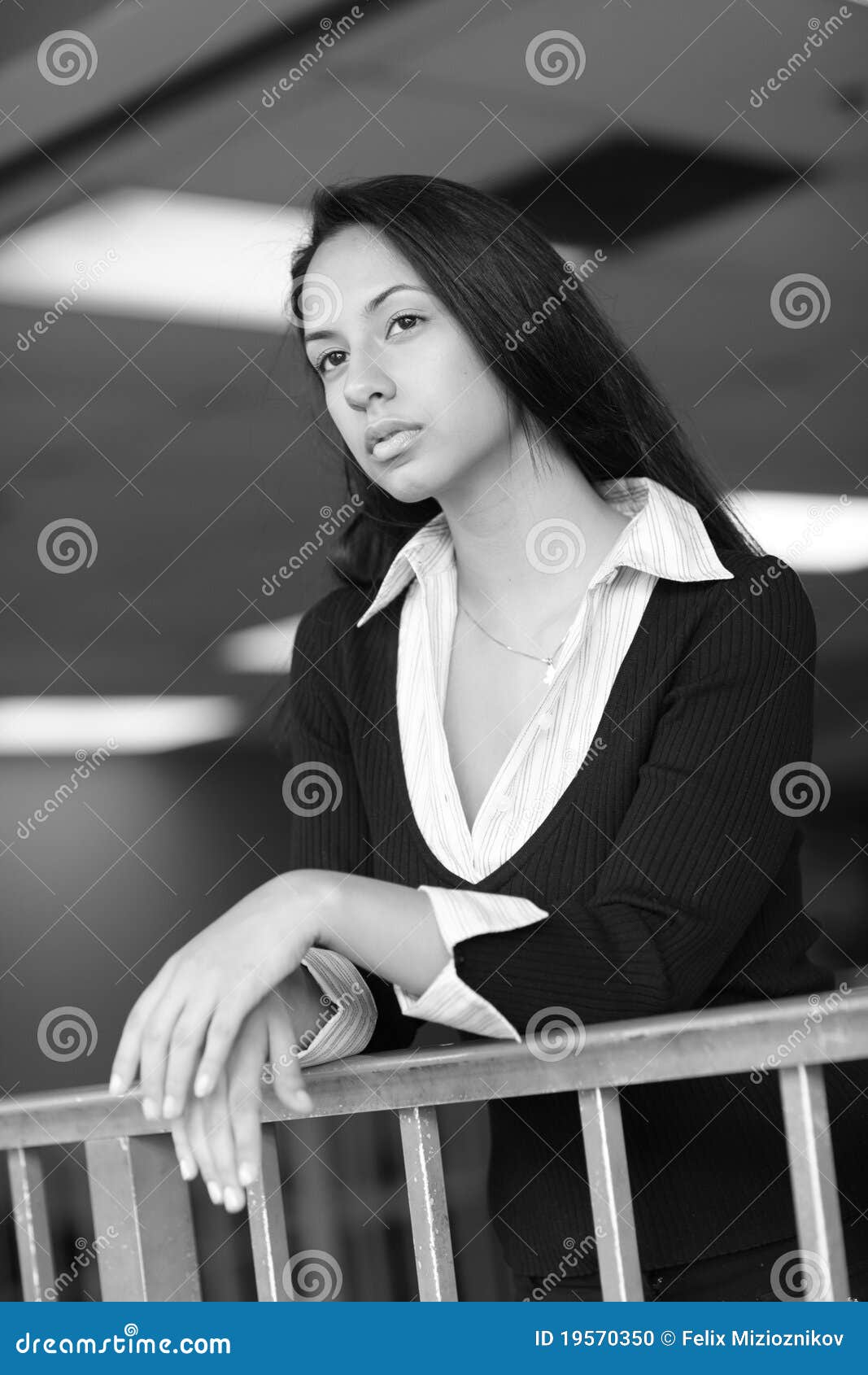 Woman leaning on a railing stock photo. Image of glance - 19570350