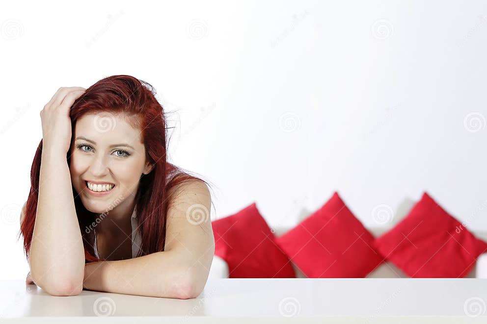 Woman Leaning on Table at Home Stock Photo - Image of smiling, resting ...