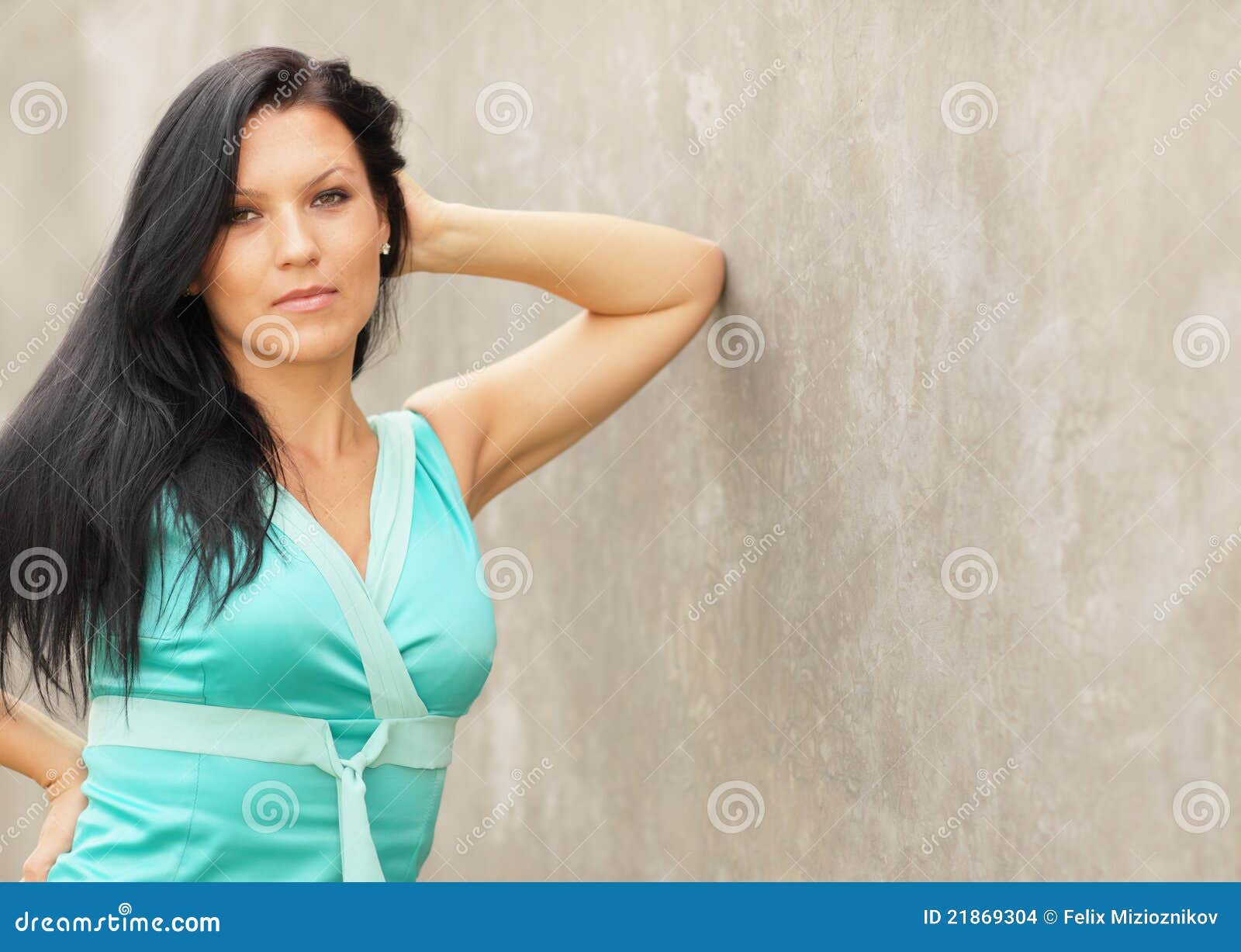 Woman leaning on the wall stock photo. Image of modern - 21869304