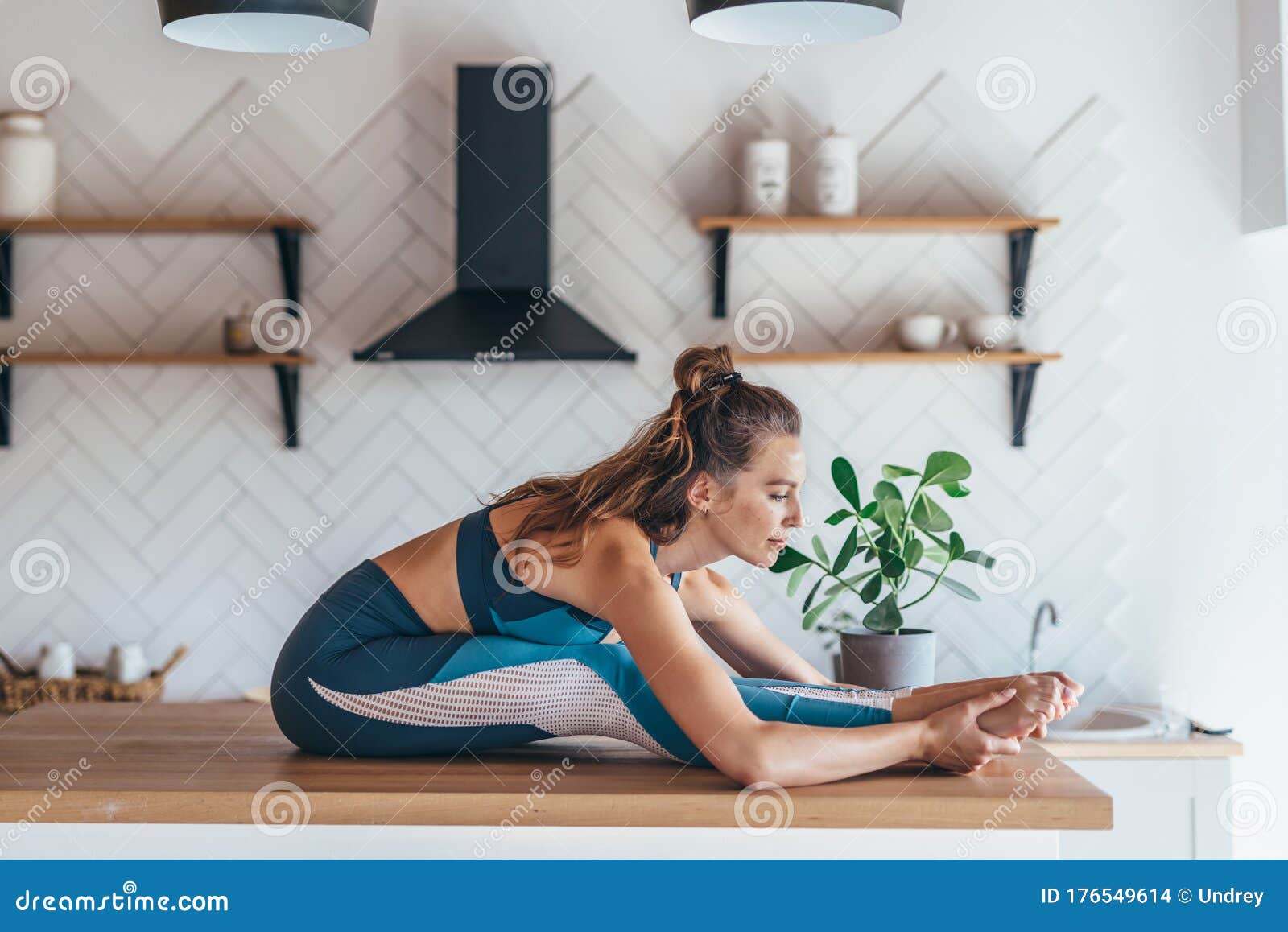 Woman Leans Forward Stretches Her Back and Legs Stock Photo - Image of ...