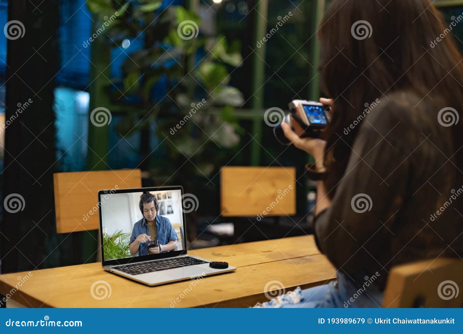 Asian Female Watching Online Training Workshops for Camera Function by ...