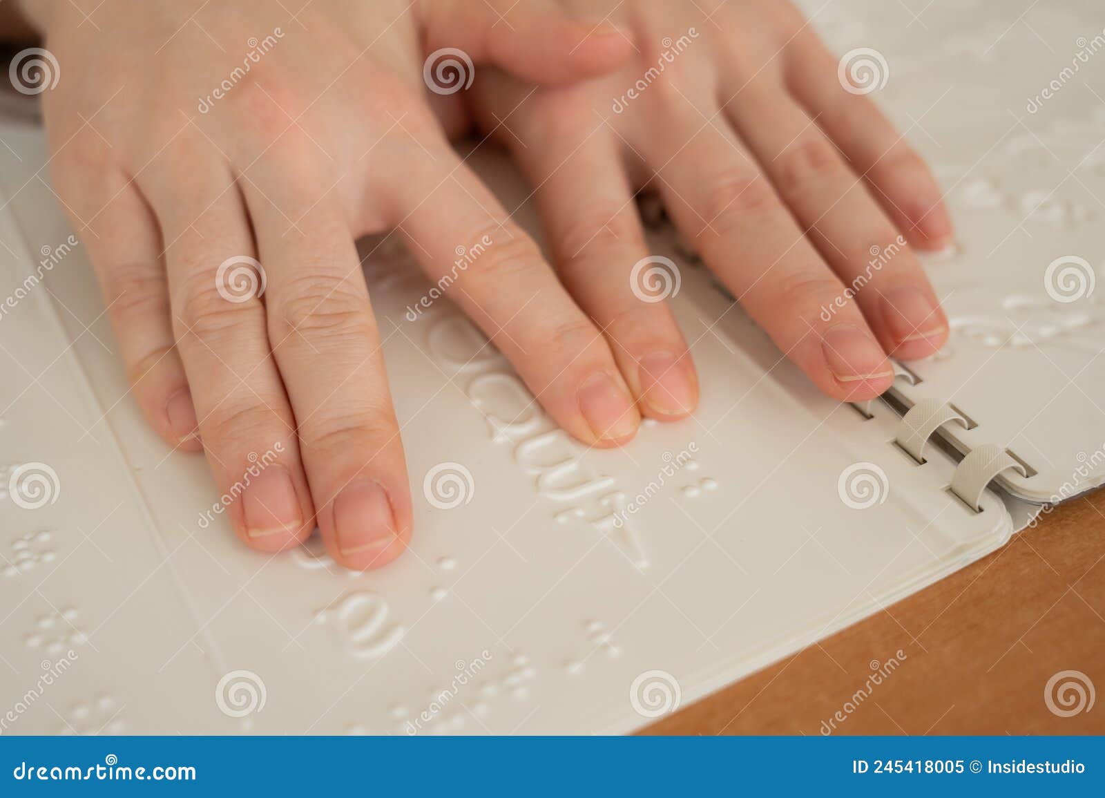 A Woman Learns the Braille Alphabet Using a Decoder. Stock Image ...