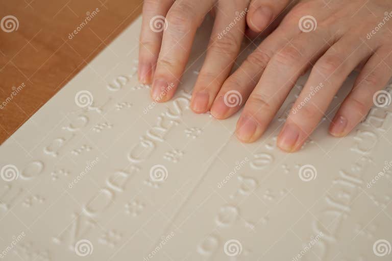 A Woman Learns the Braille Alphabet Using a Decoder. Stock Image ...