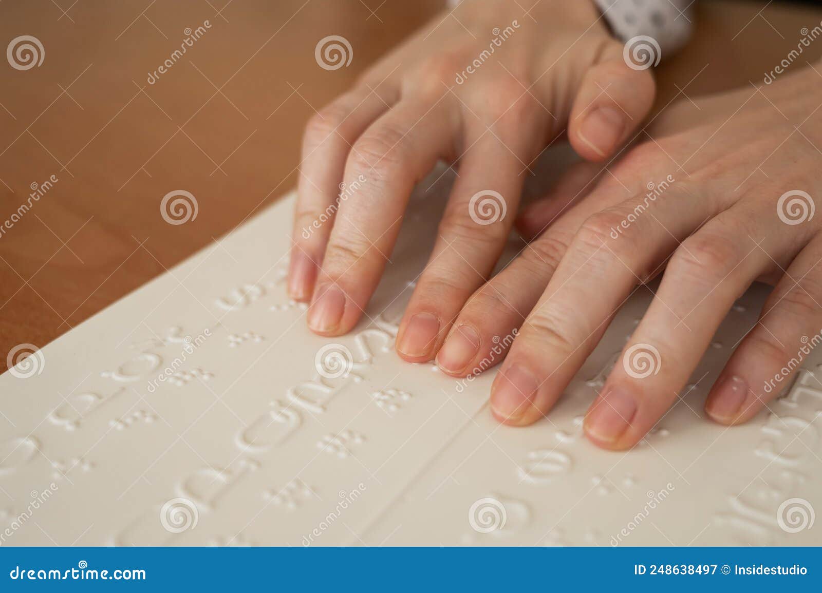 A Woman Learns the Braille Alphabet Using a Decoder. Stock Image ...